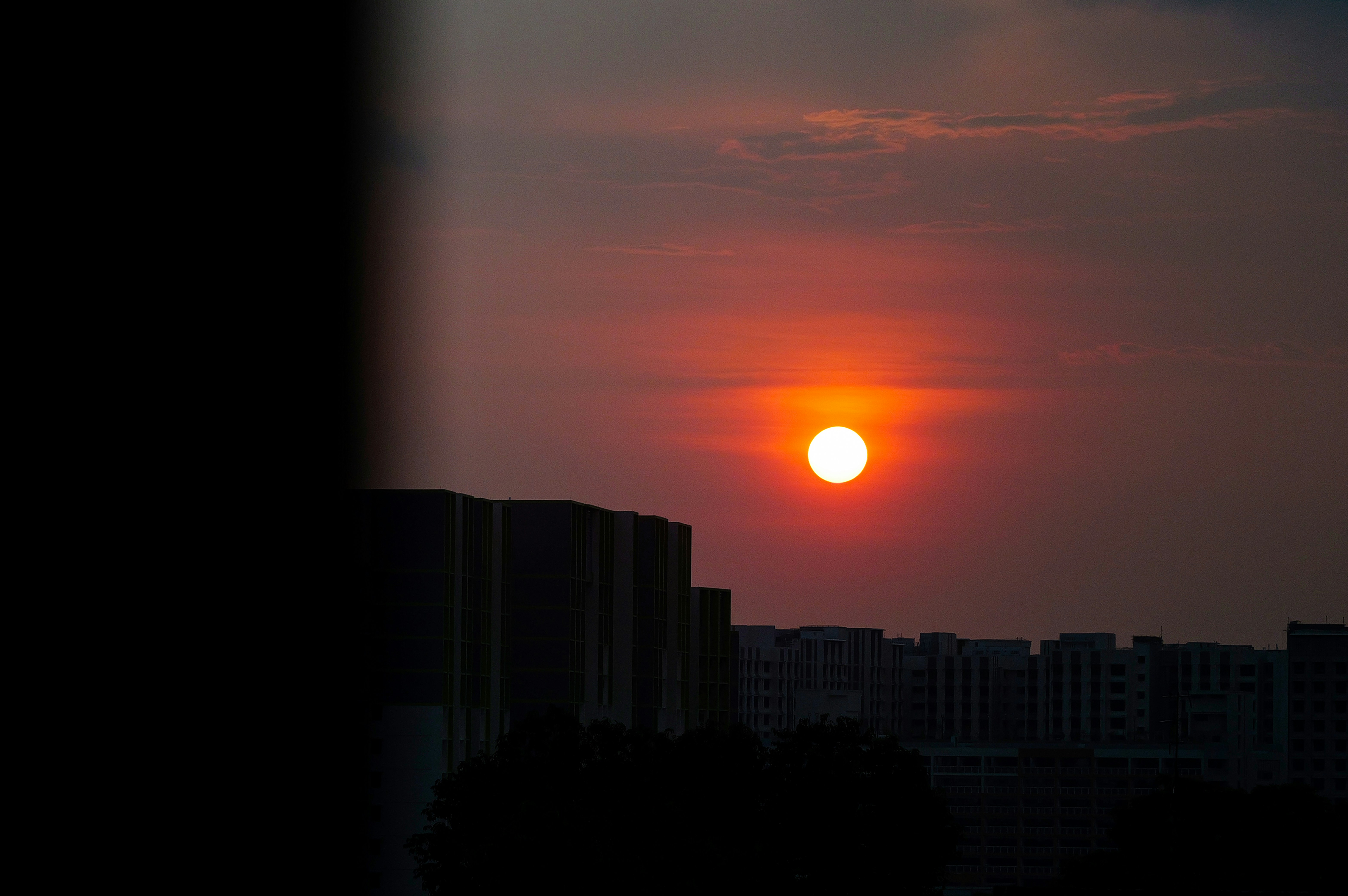 Sunset Over the Urban Horizon with a Obscured Left Edge