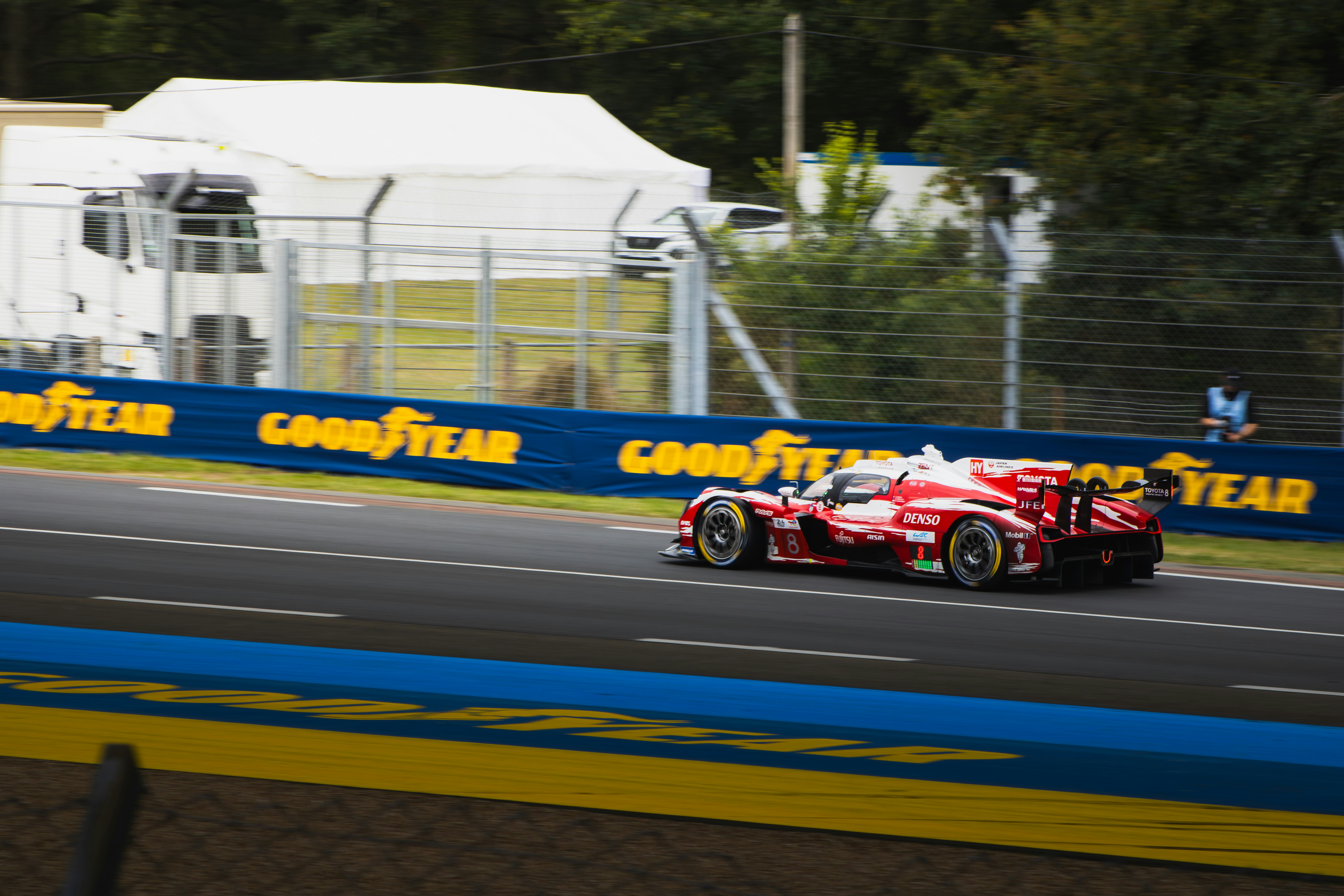 Red Lightning on the Asphalt: A Dusk-Driven Formula Brach