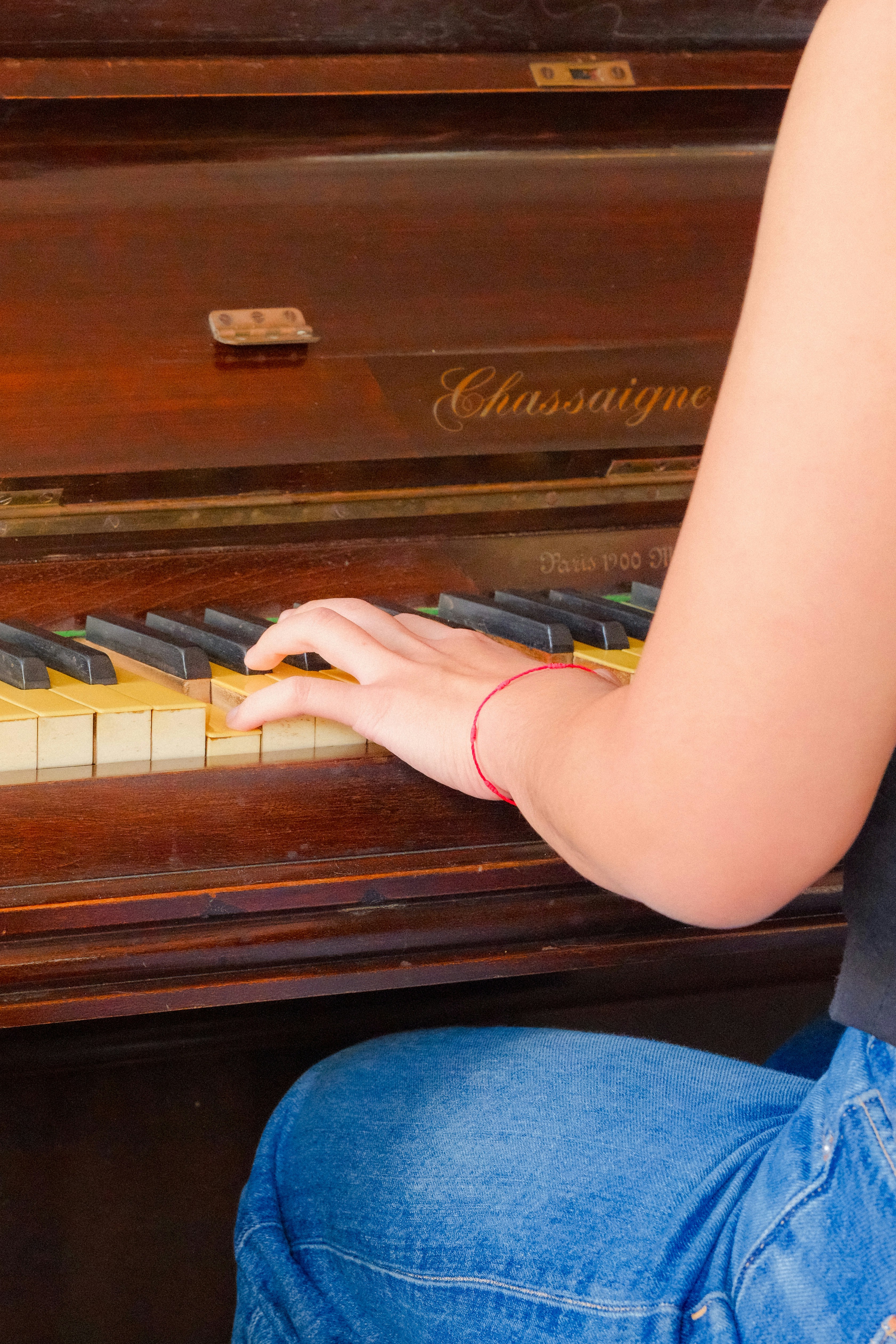 Hands on Keys: A Child’s Focus at the Piano