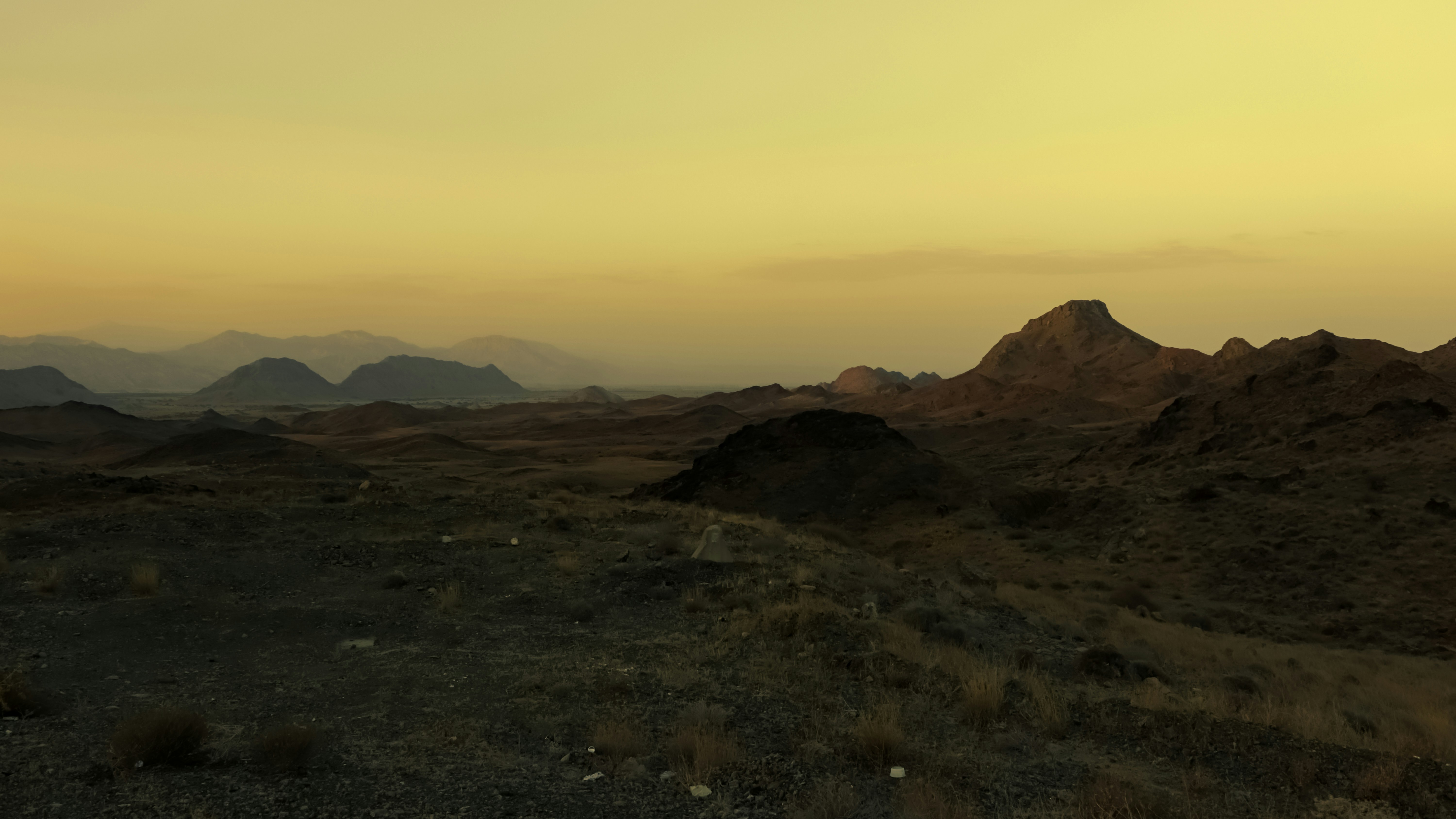 Desert Silhouettes at Dusk Over Silent Rocks