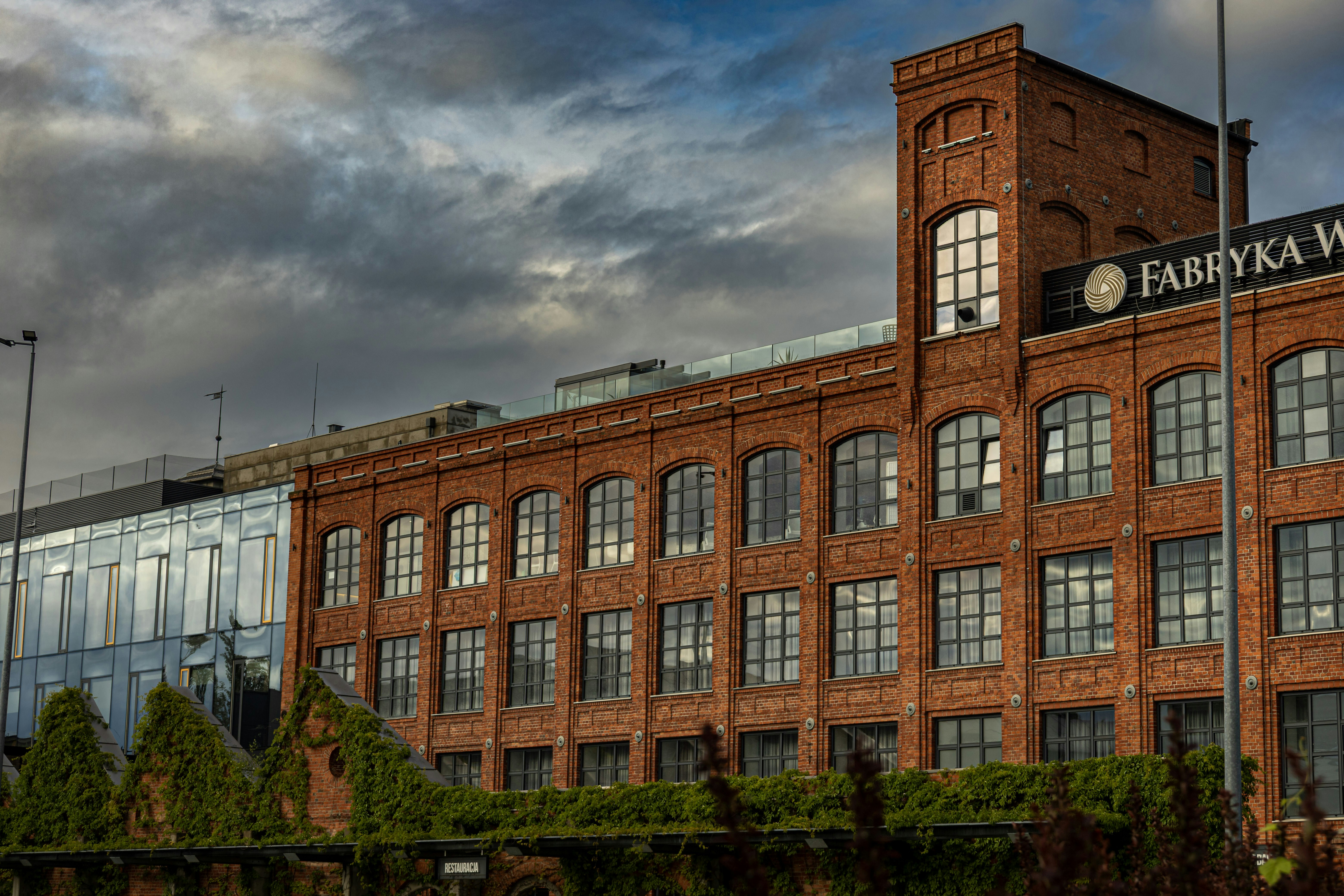 Brickwork Echoes: The Factory Clock Tower Under a Brooding Sky