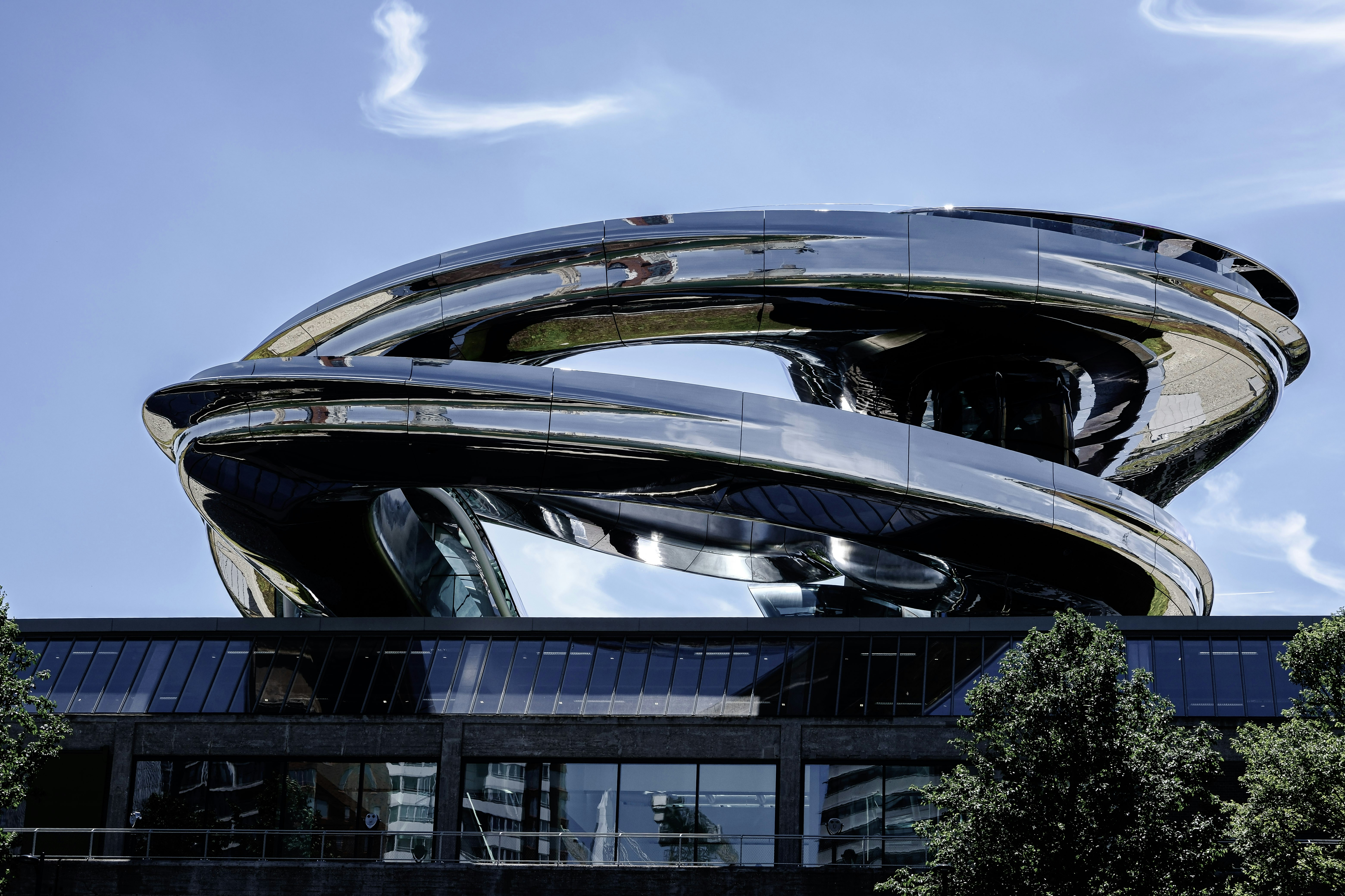 Chromed Helix Overlook: A Clockwork Building Reaches for the Sky