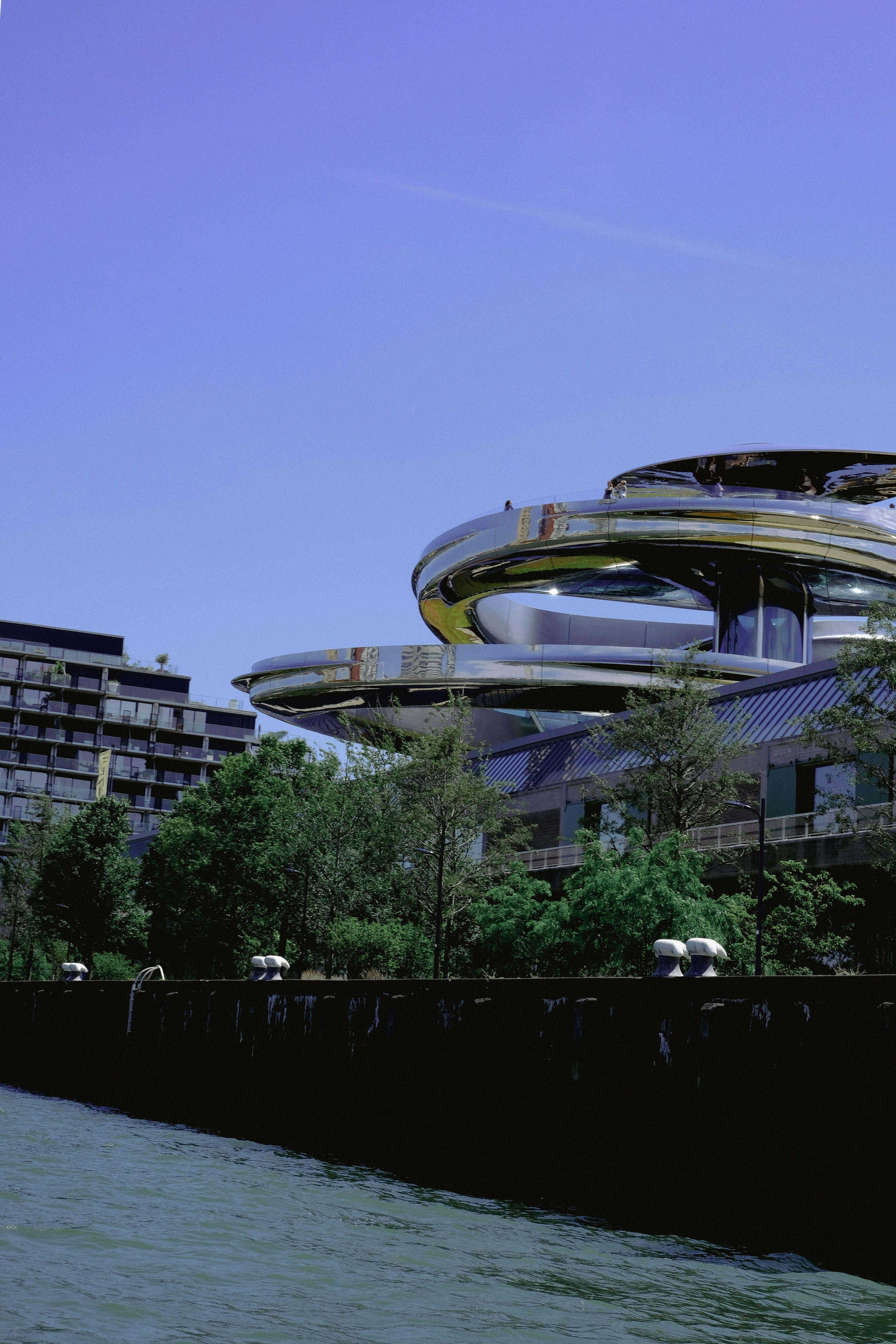 Rings of chrome over the riverfront: a futuristic building draws the skyline