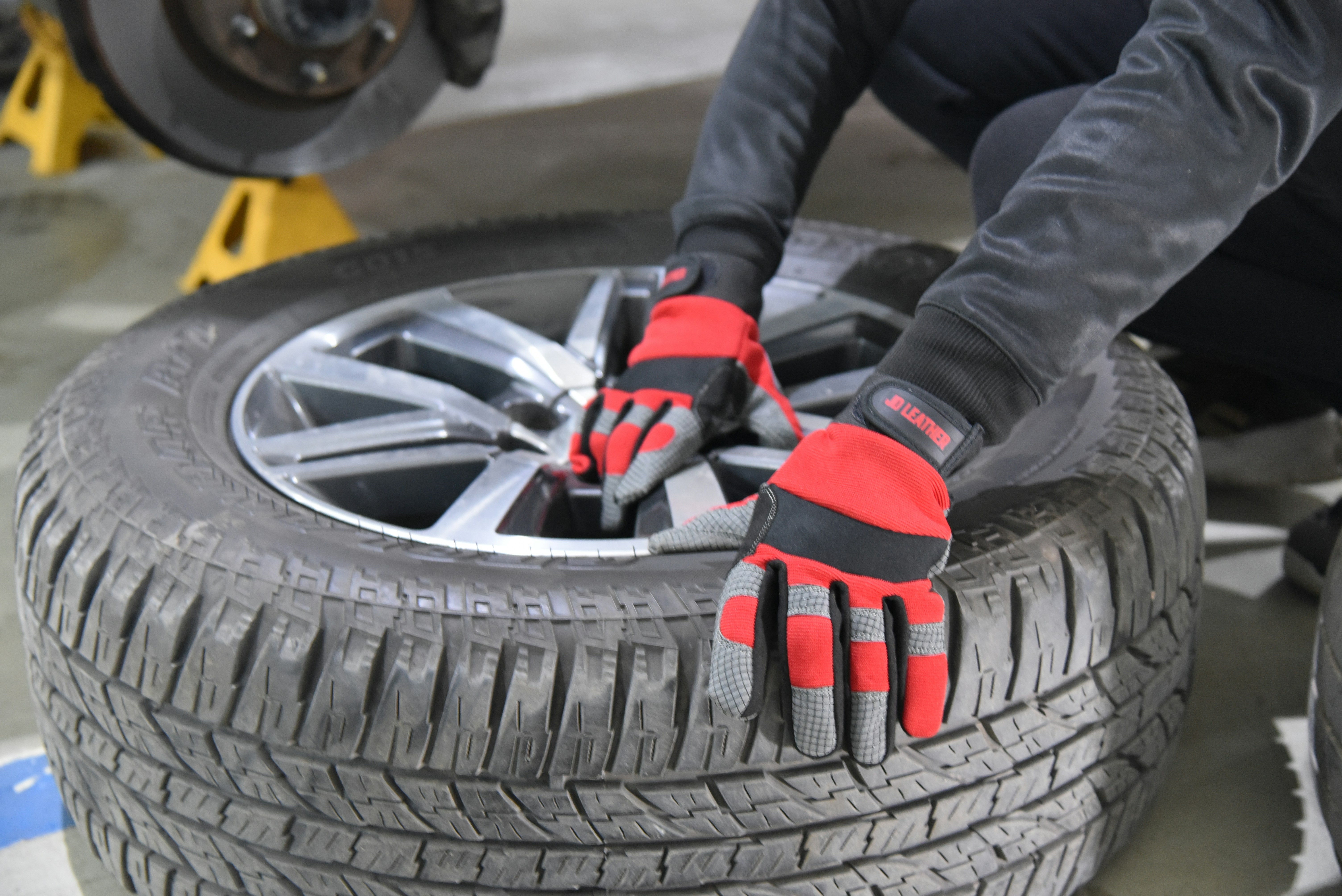 Hands at Work: Tire Change in a Workshop