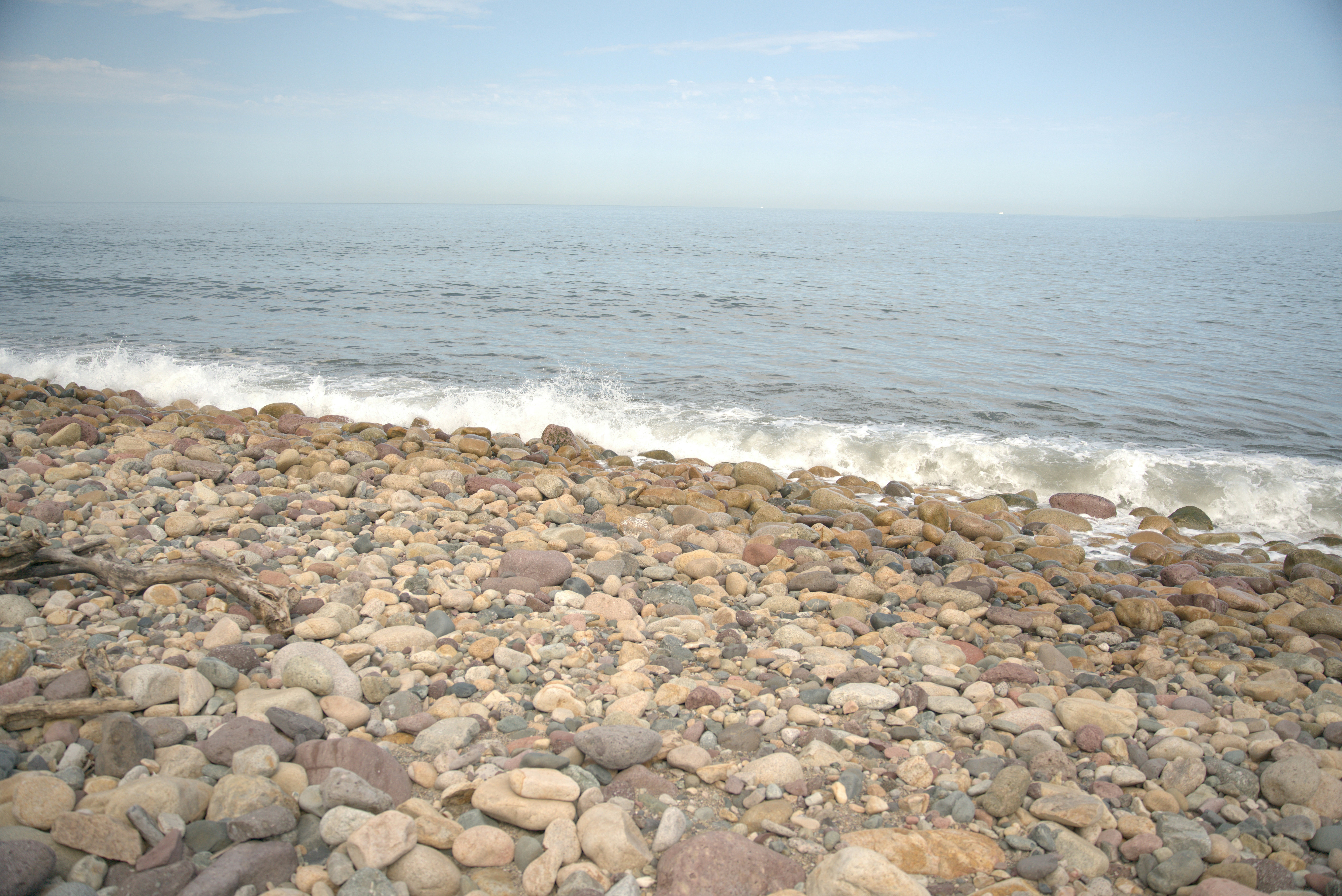 Pebbles Meet Tides: A Quiet Seashore Study