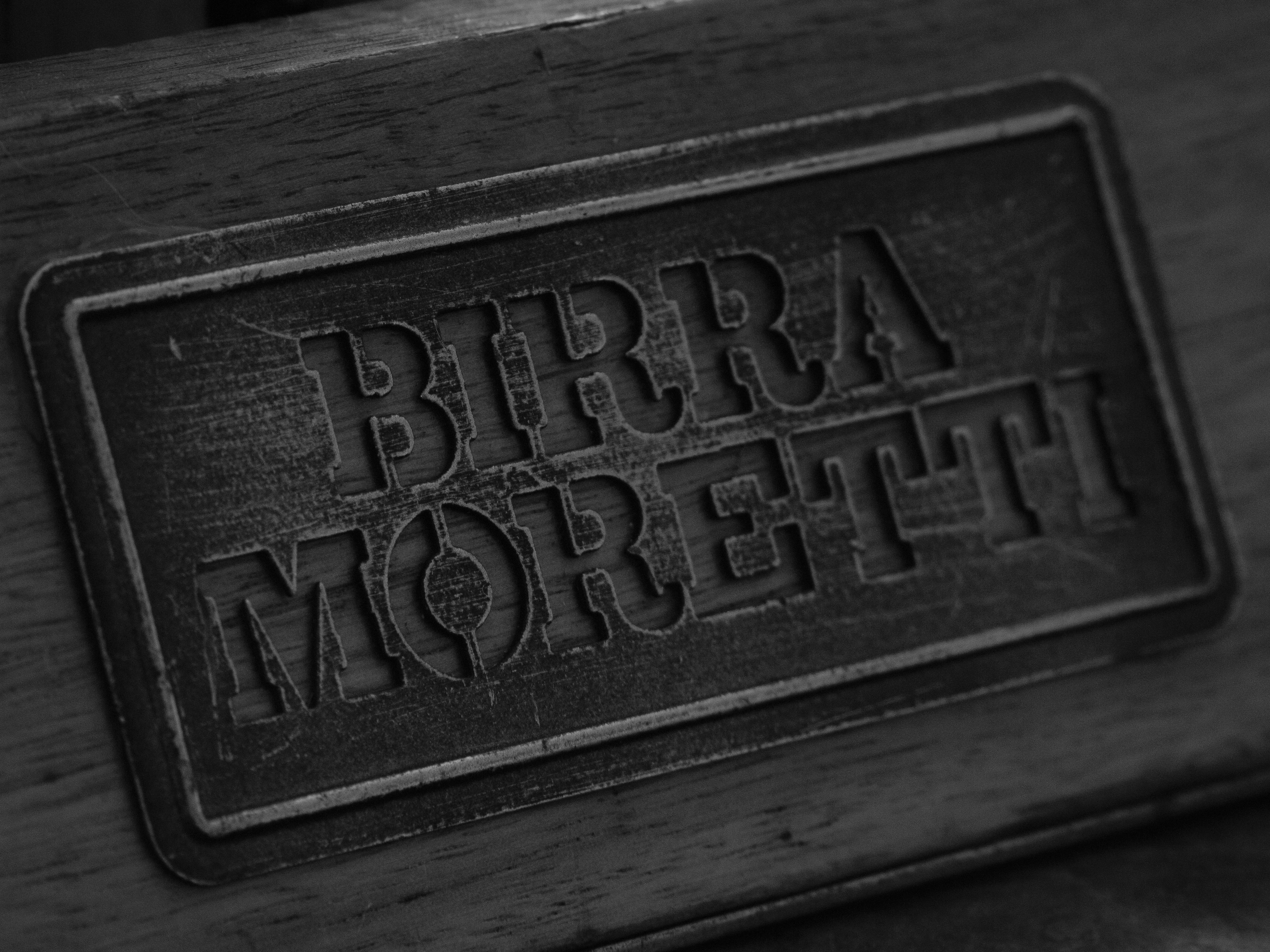 Relief in Gravitas: A Close-up of the Birra Moretti Plaque