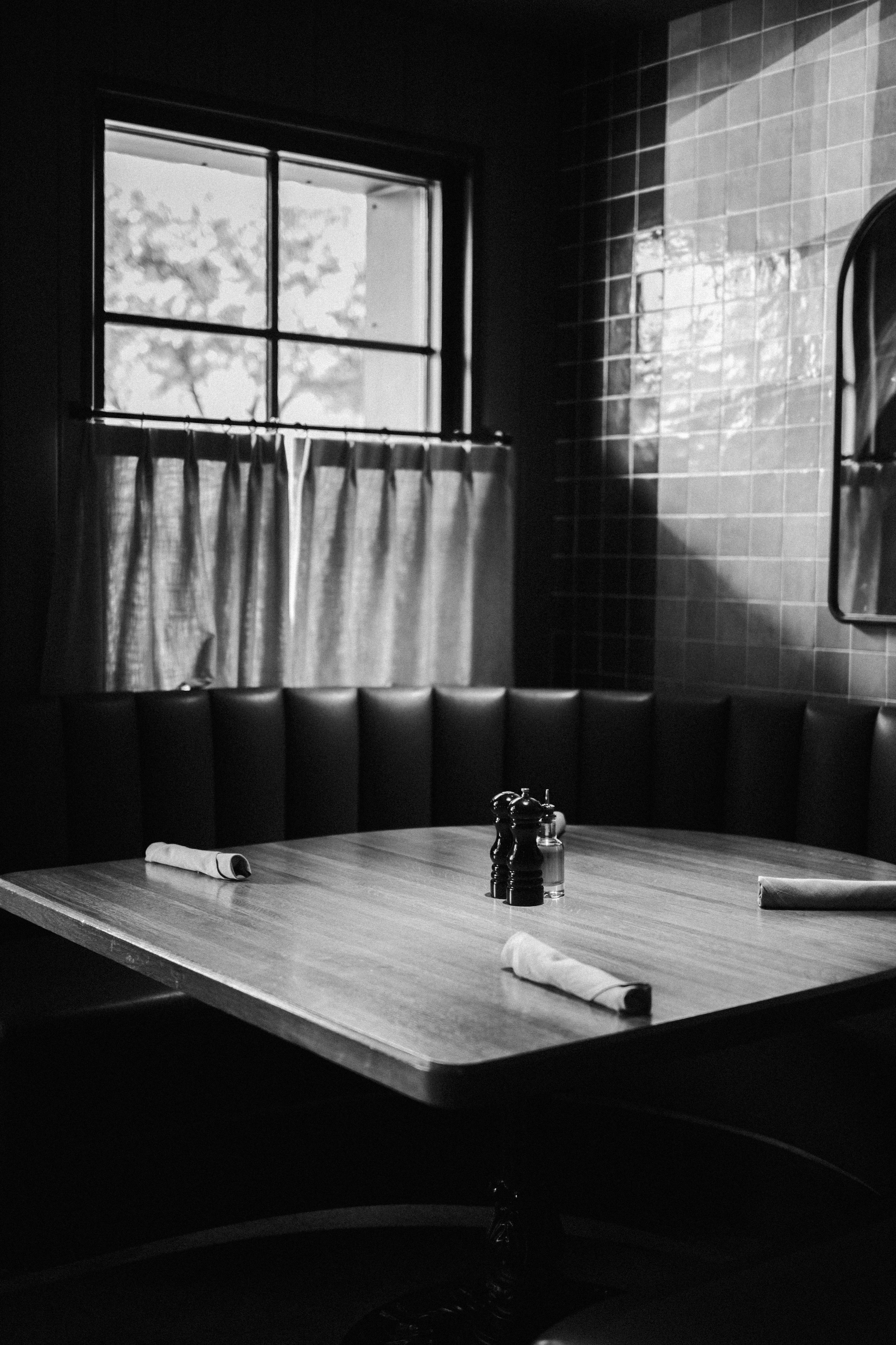 Midday Stillness in a Noir Booth