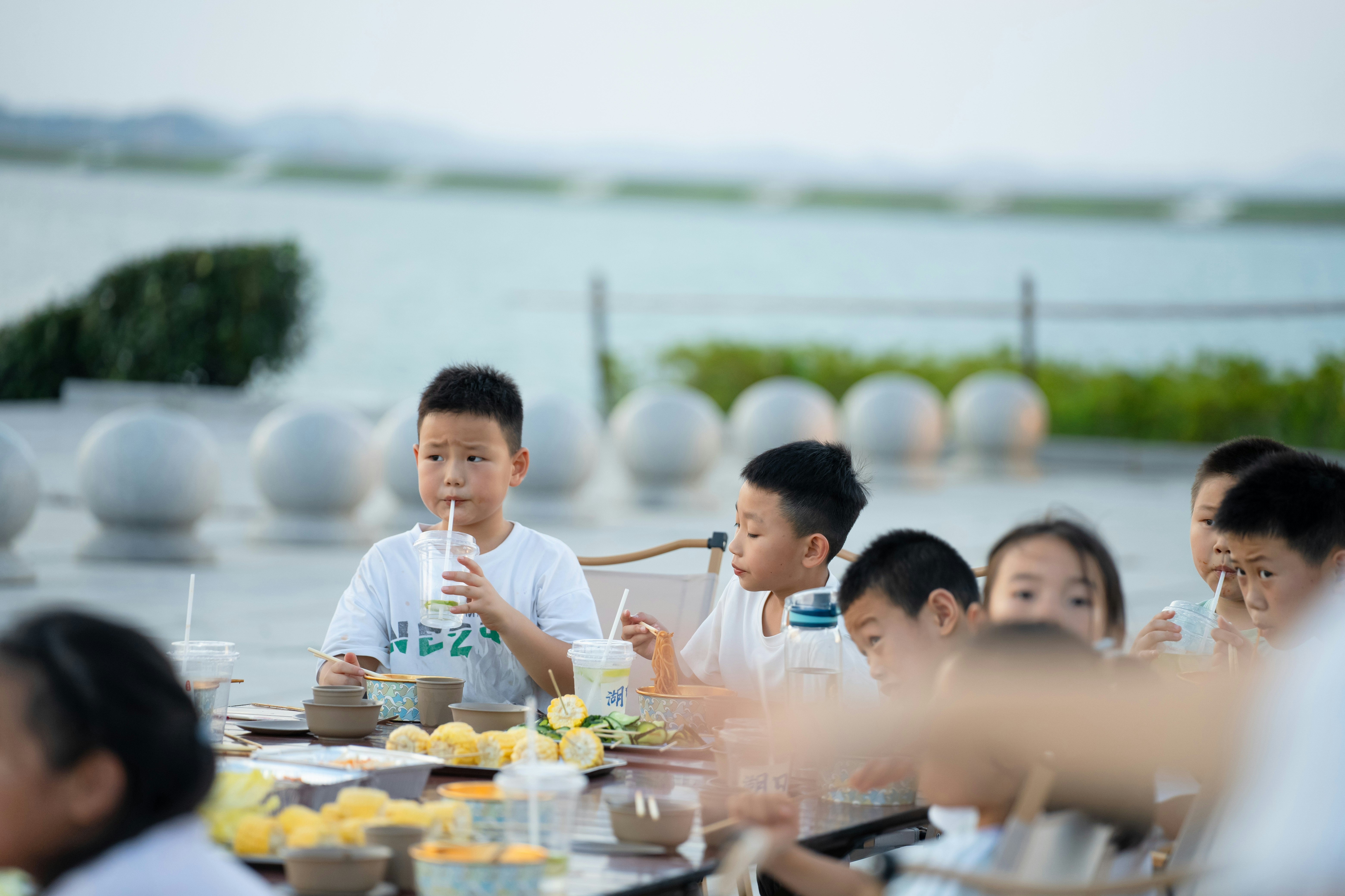 Laughter Lines and Lemonades: A Sunlit Meal Moment