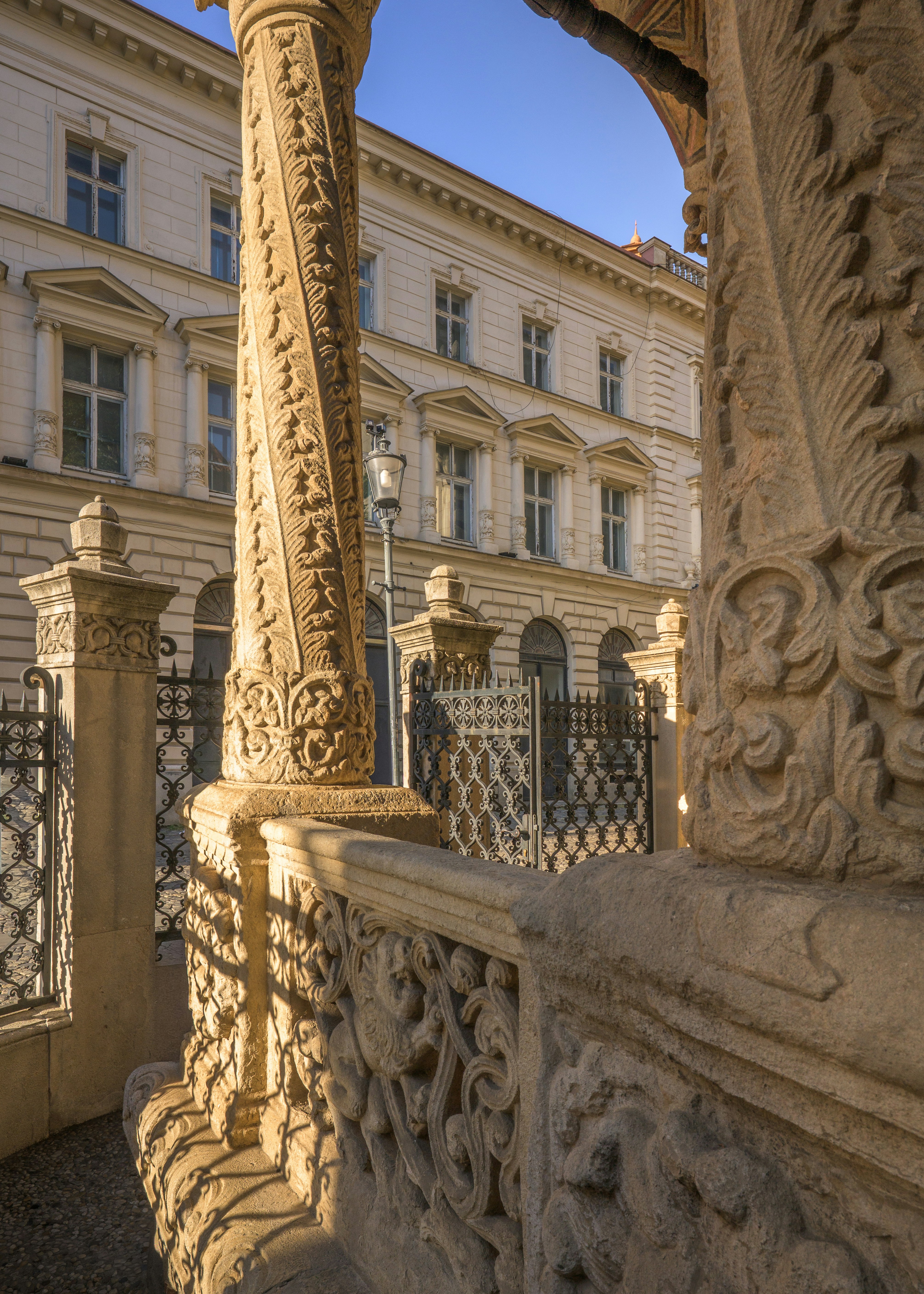 Carved Column Frieze Overlooking a Historic Facade