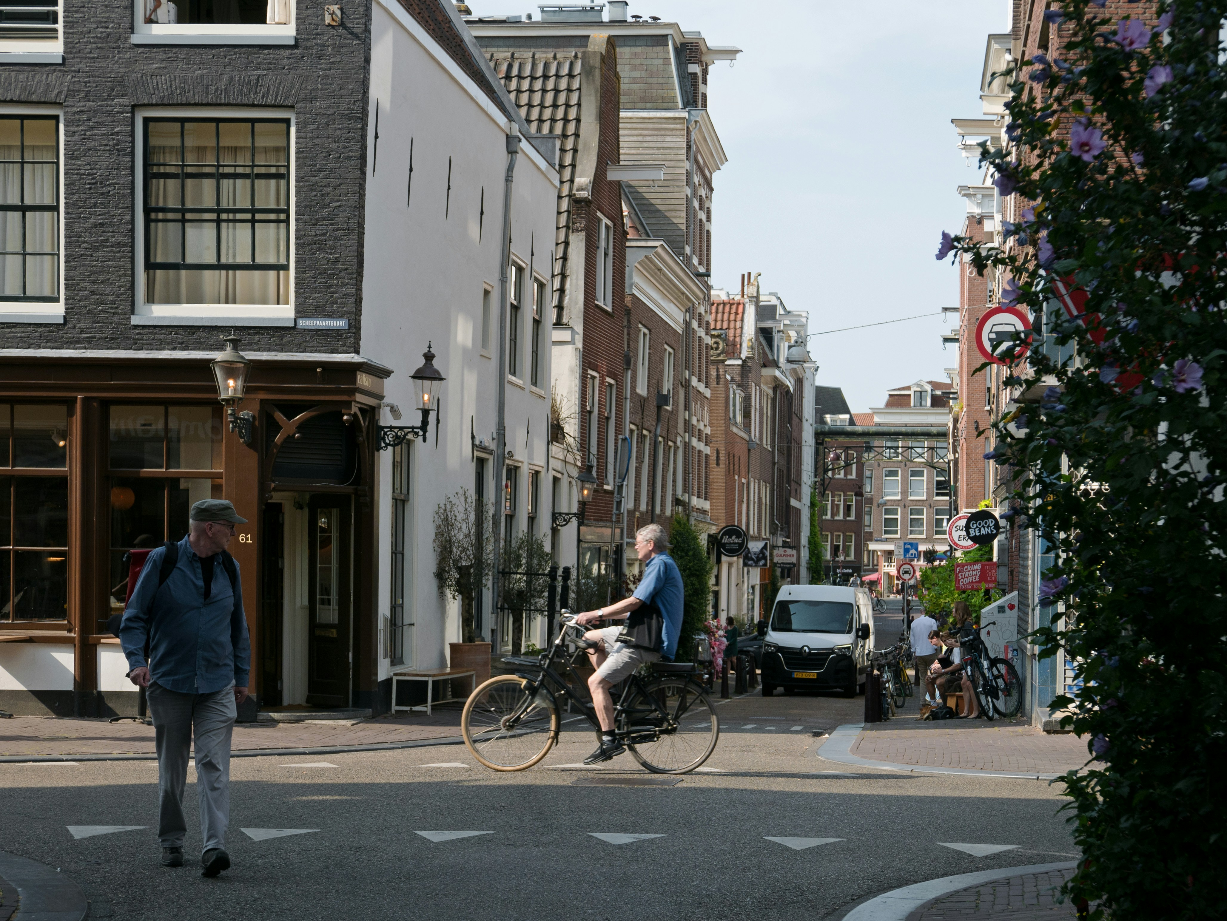 Urban Crossing: A Quiet Moment in a Dutch Street