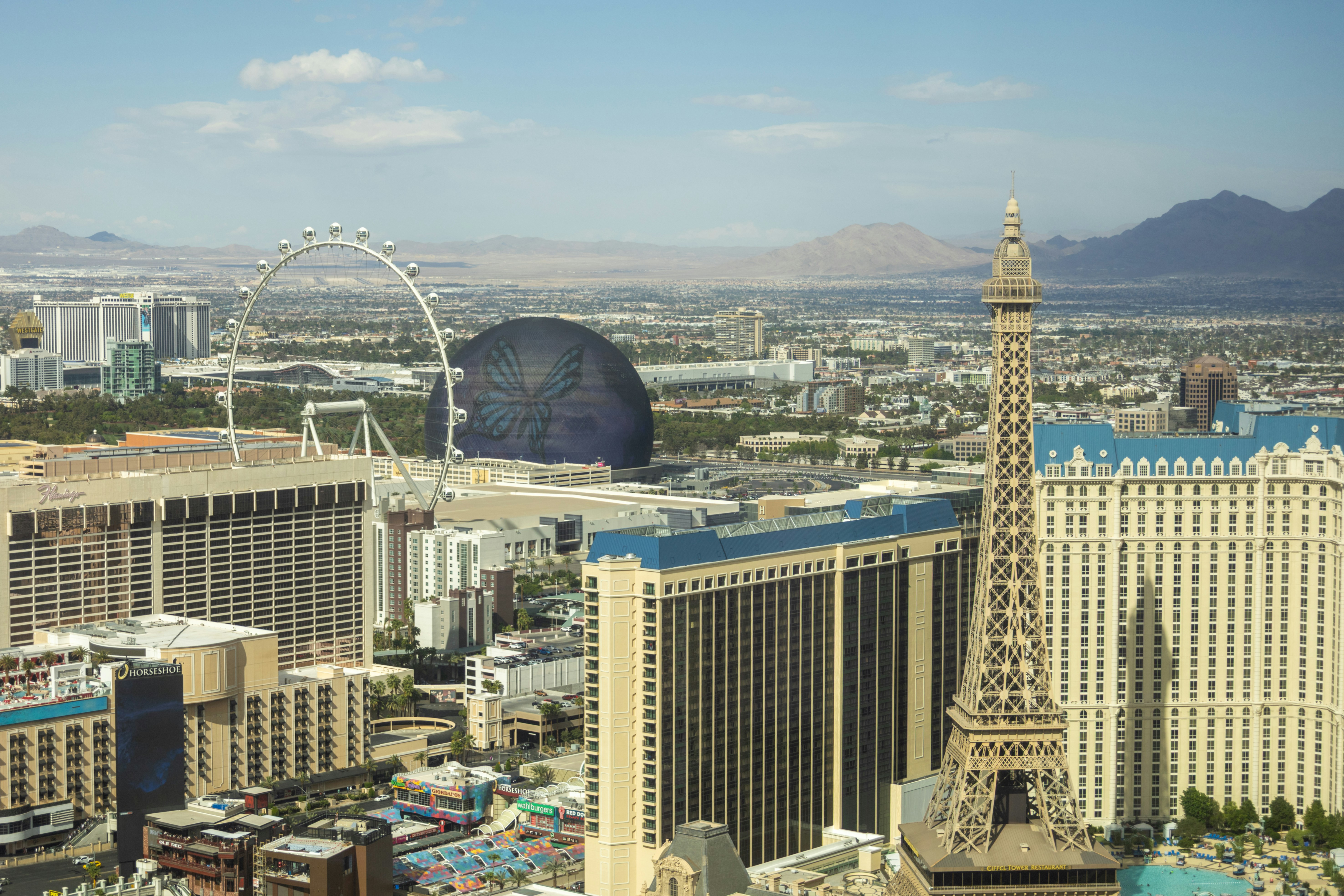Desert Skyline: The Eiffel Tower-Style Spire Amid Las Vegas Towers