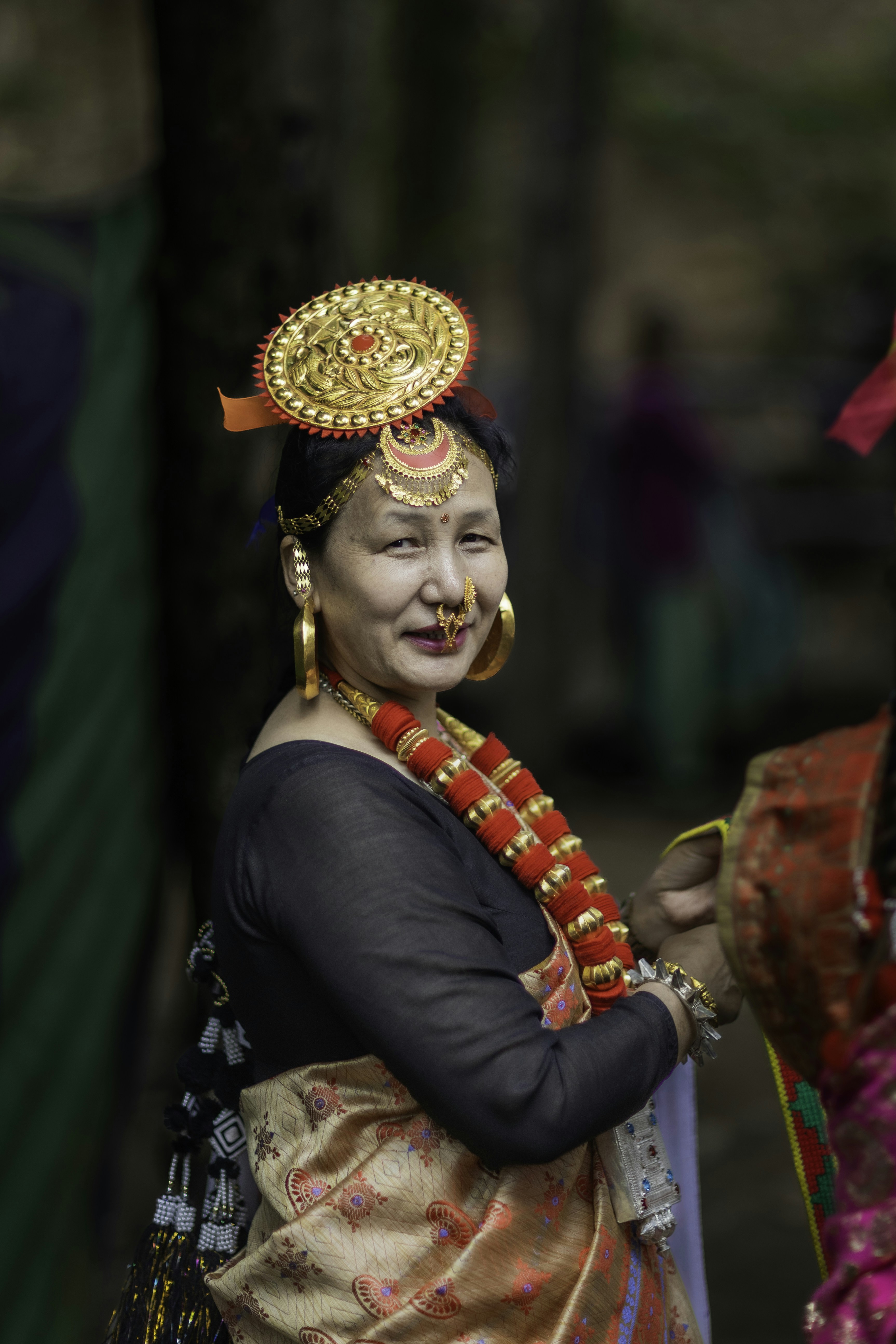 Adornment and Poise: A Moment in Traditional Garb