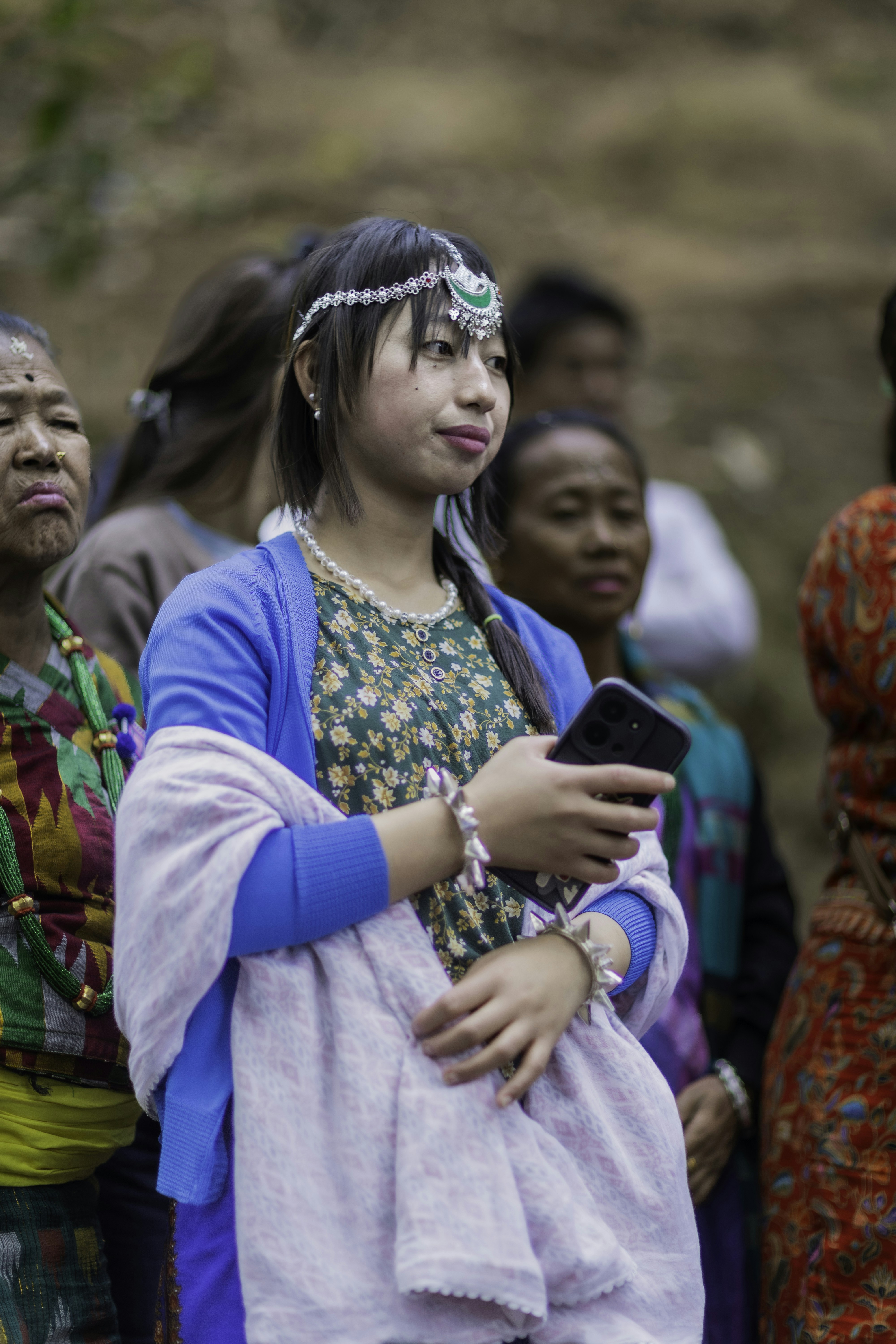 Center Stage in Color: A young woman in blue embraces a cultural moment