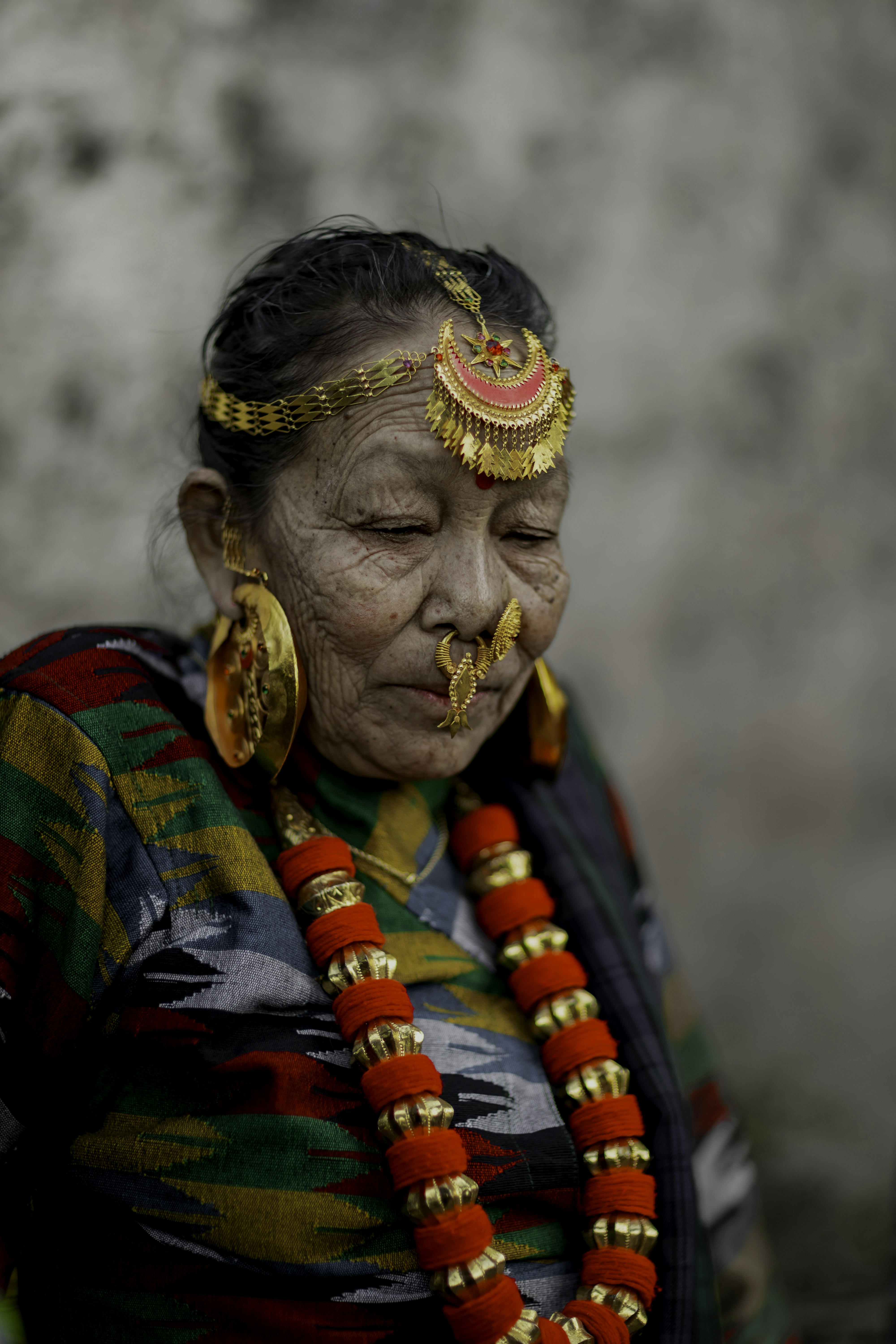 Adornment of Time: A Elder's Portrait in Gold and Color