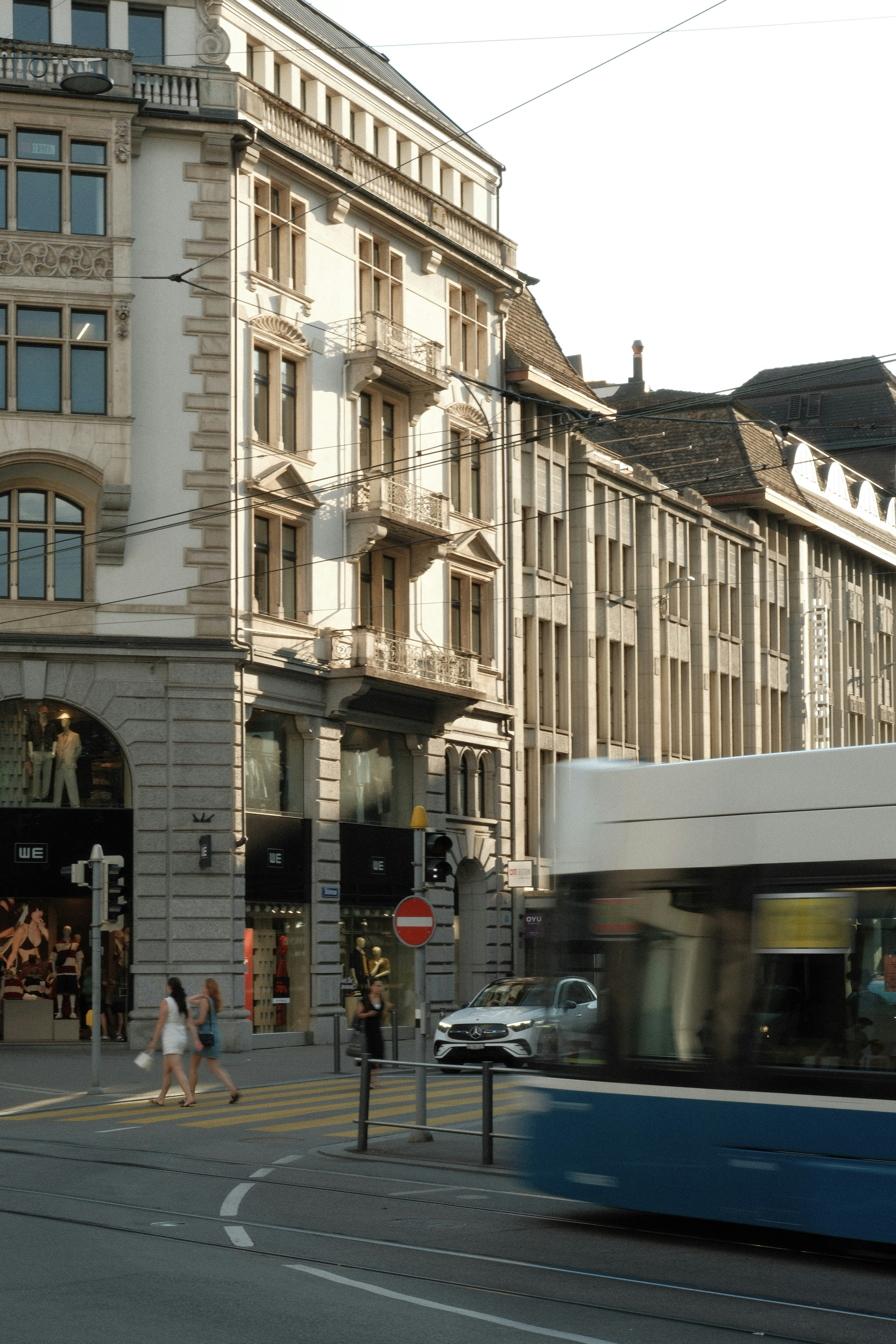 A City in Motion: Historic Façade Framed by Passing Tram