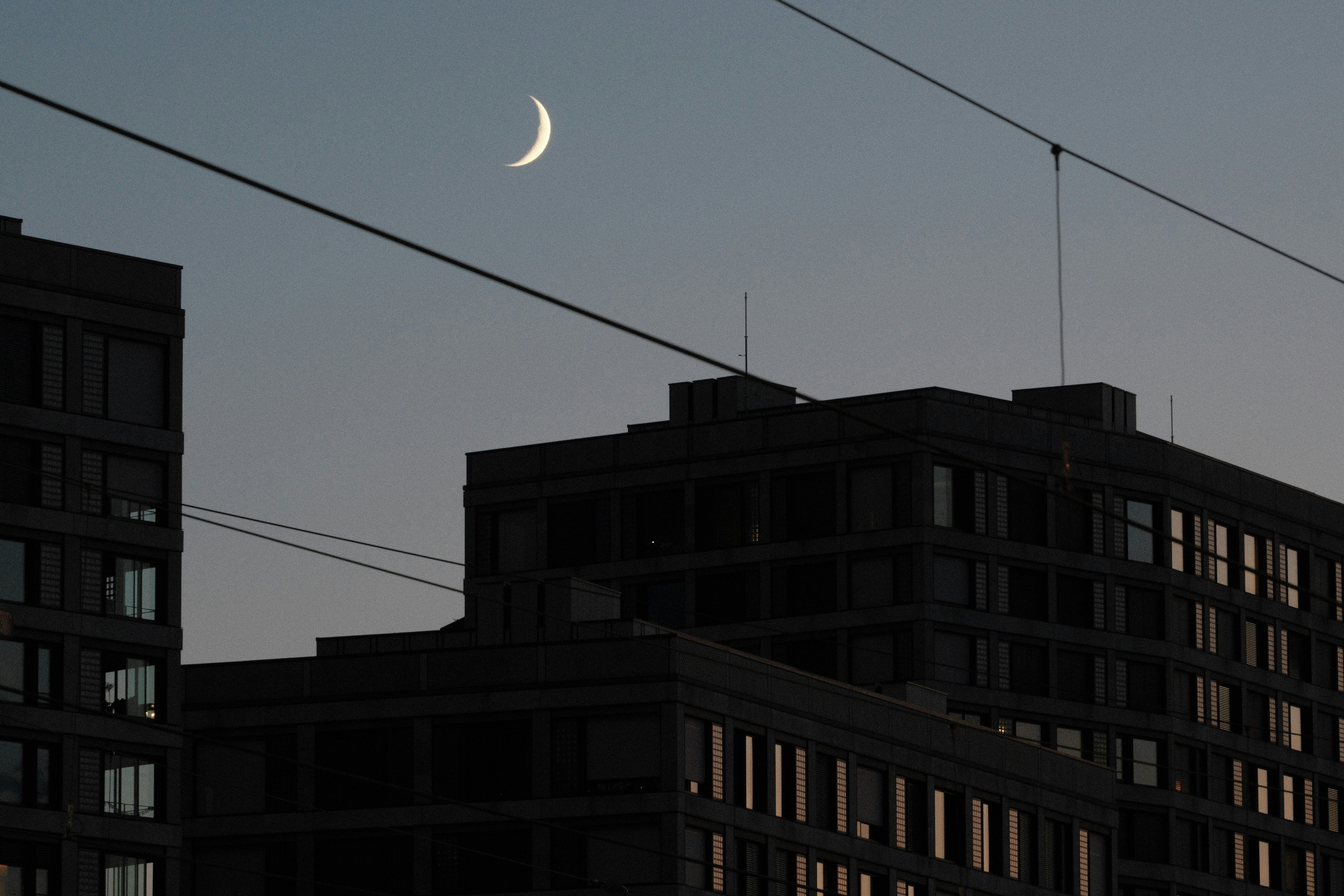 Crescent Over City Silhouettes