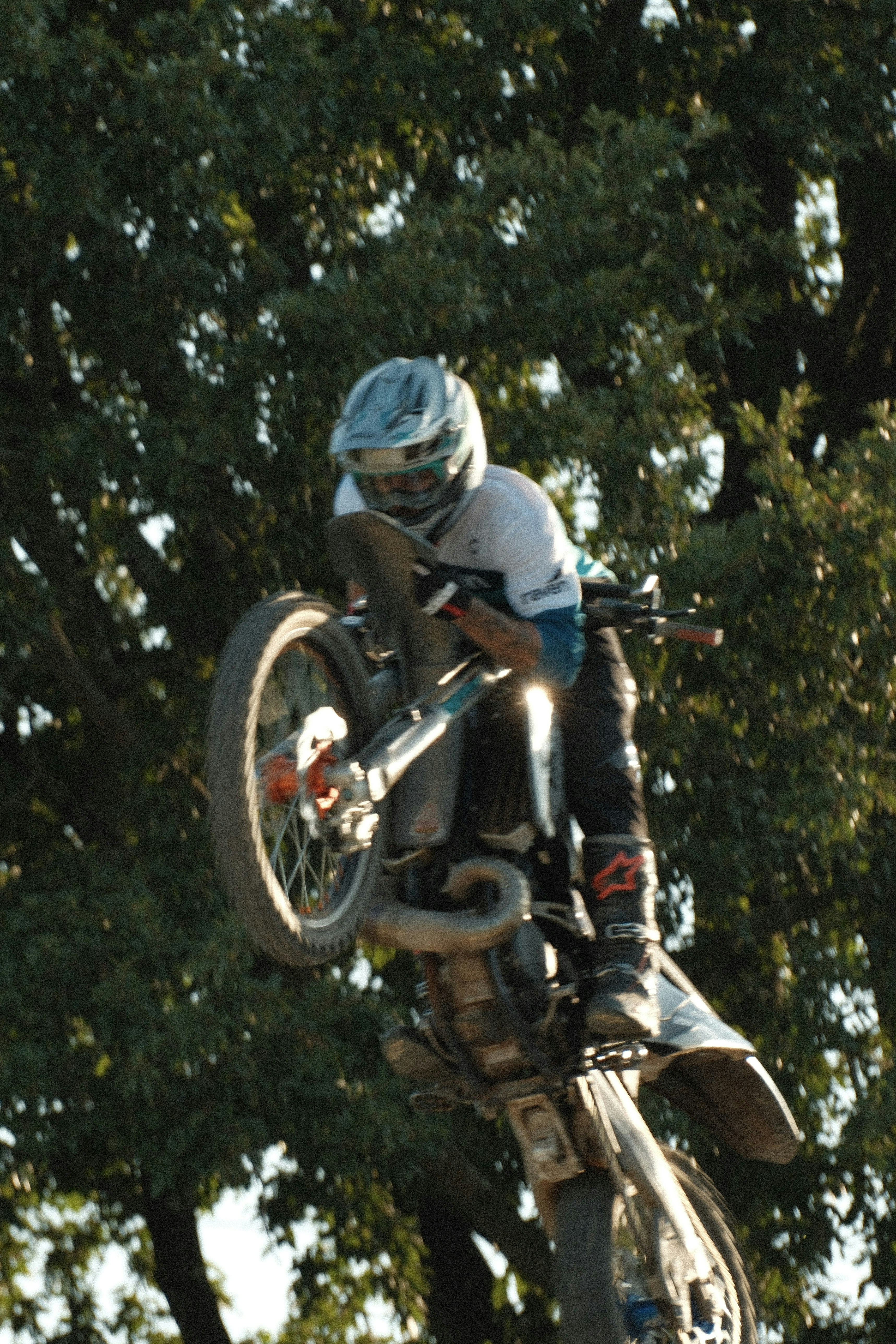 Mid-Air Moto: Rider,$_uncontrolled leap over a rugged trail