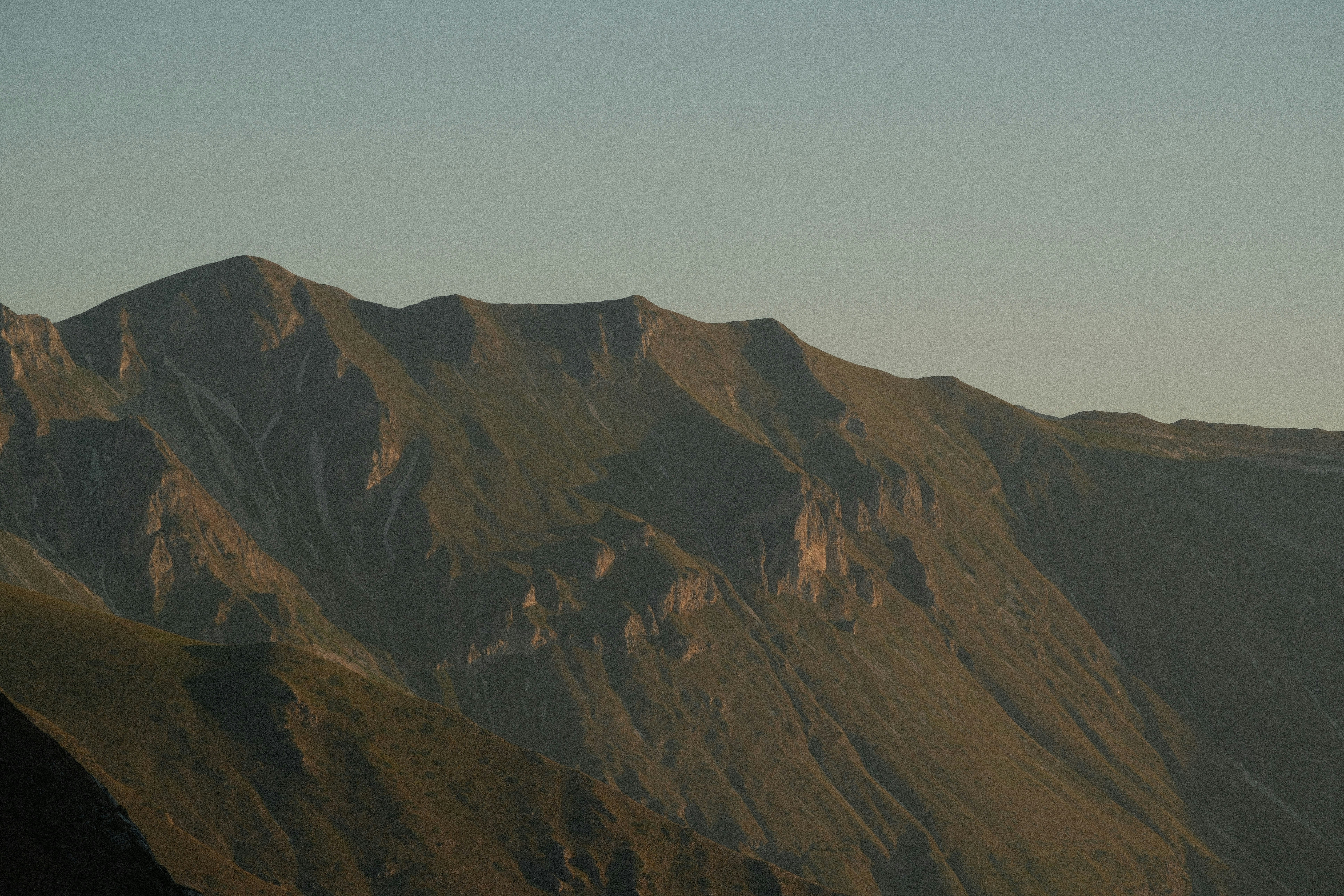 Golden Ridge: A Quiet Imprint of Mountain Lines at Dusk