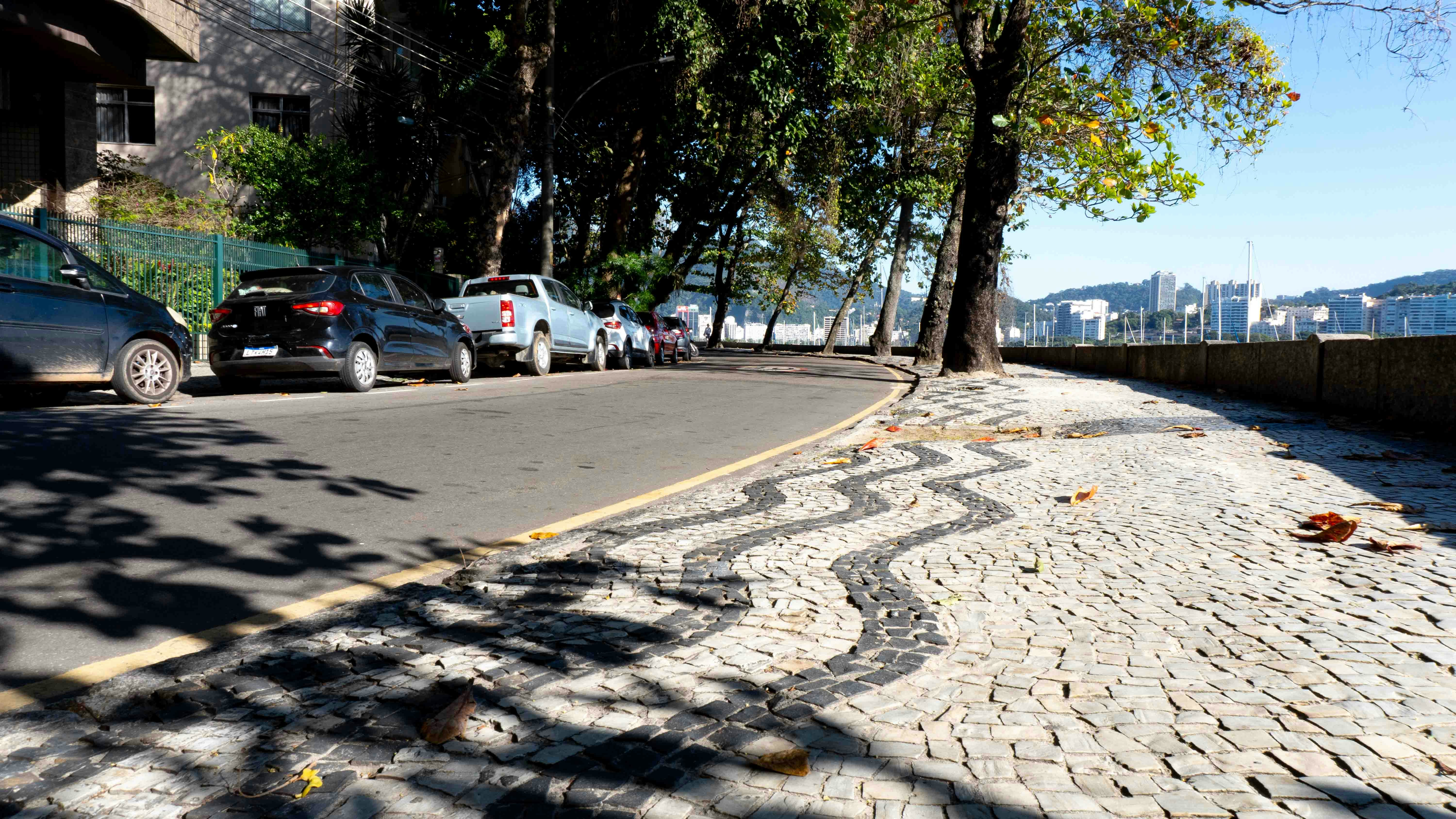 Curved Cobblestones Lead the Shoreline Road