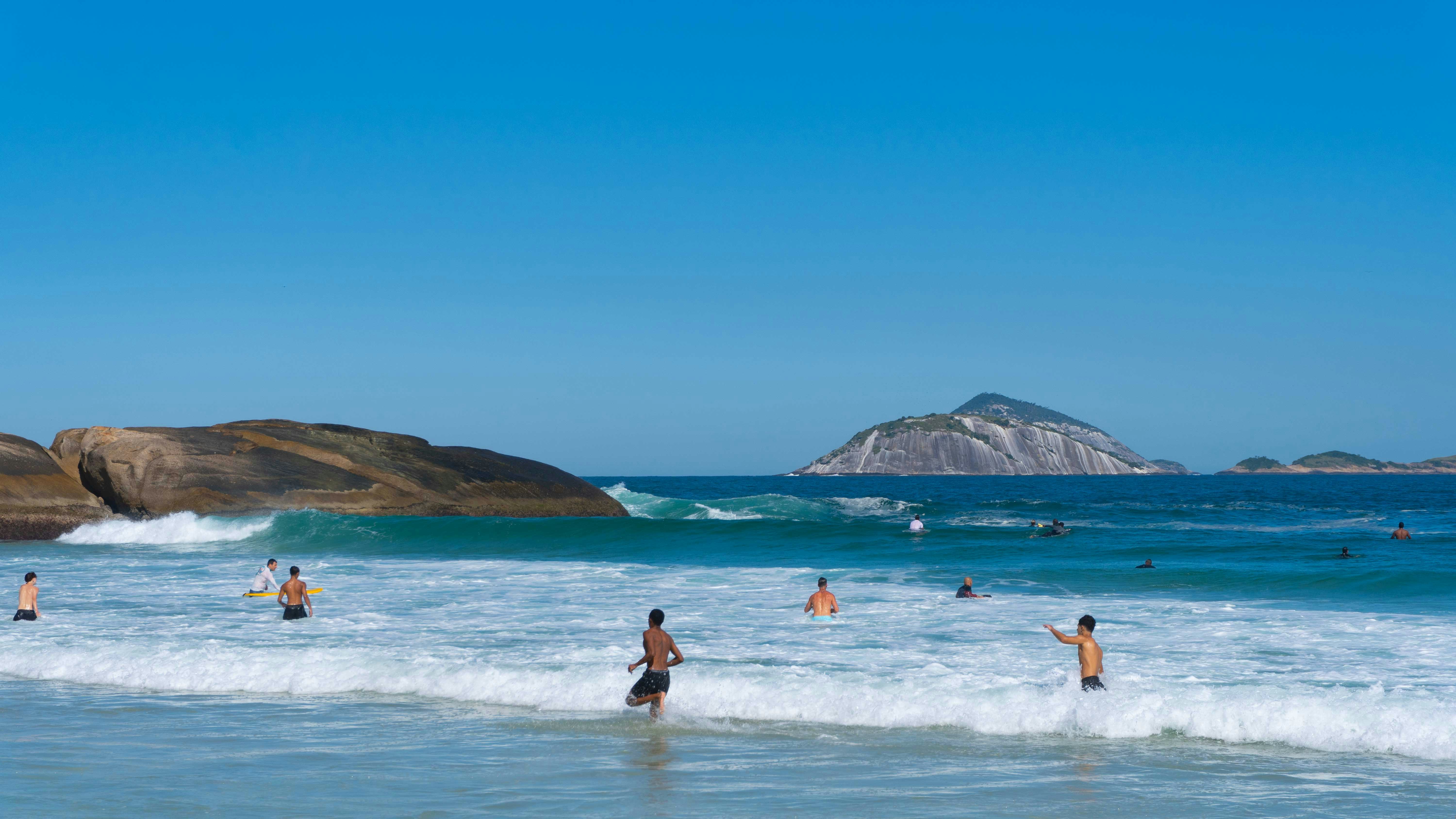 Blue Wave Rendezvous: Surfers at Sundown Beach