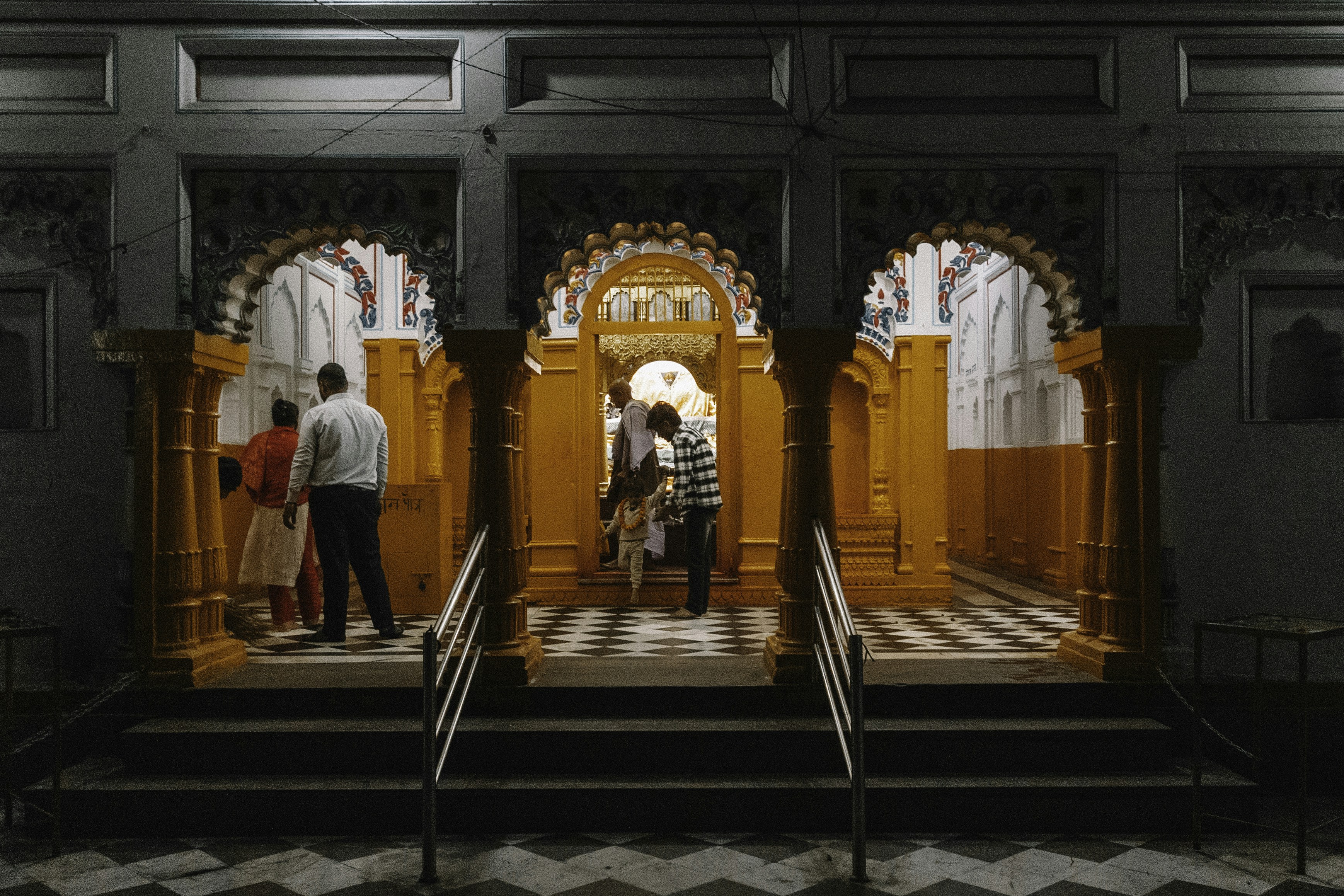 Doorway to Warmth: Inside a Temple Courtyard