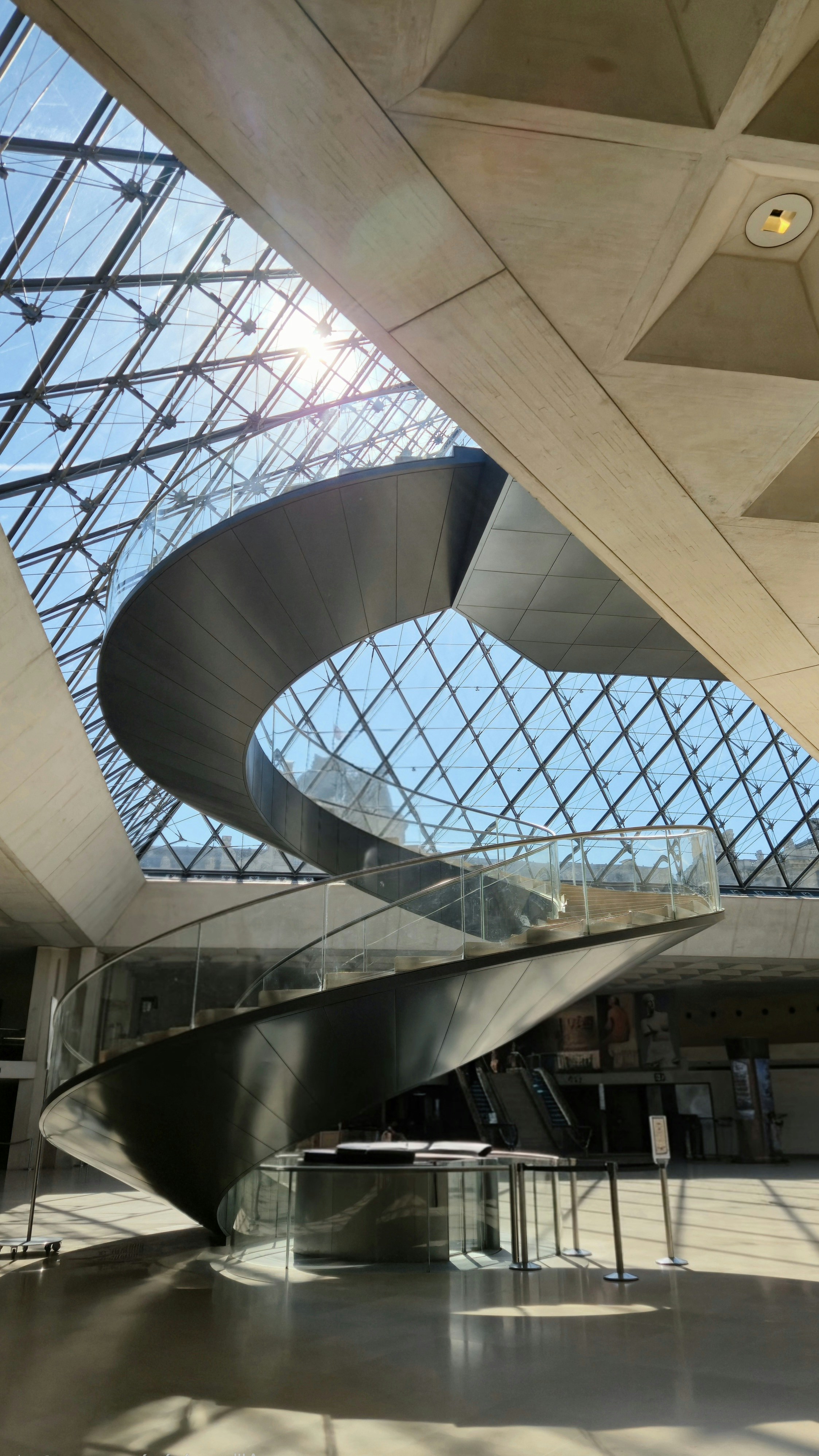 Spiral Steel and Glass: Ascending Through Light and Geometry