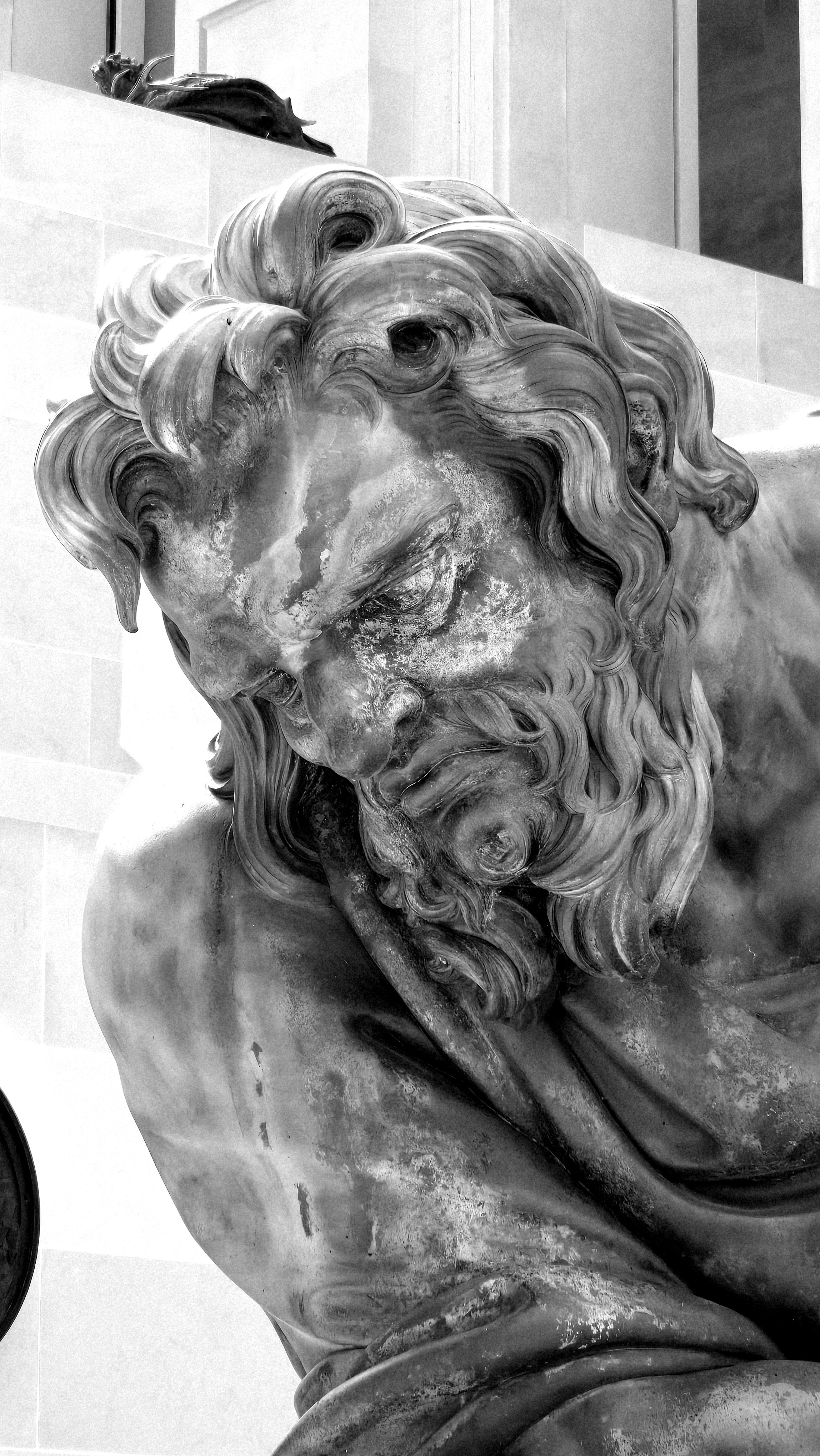 Weathered Reverie: A Classical Statue in Monochrome
