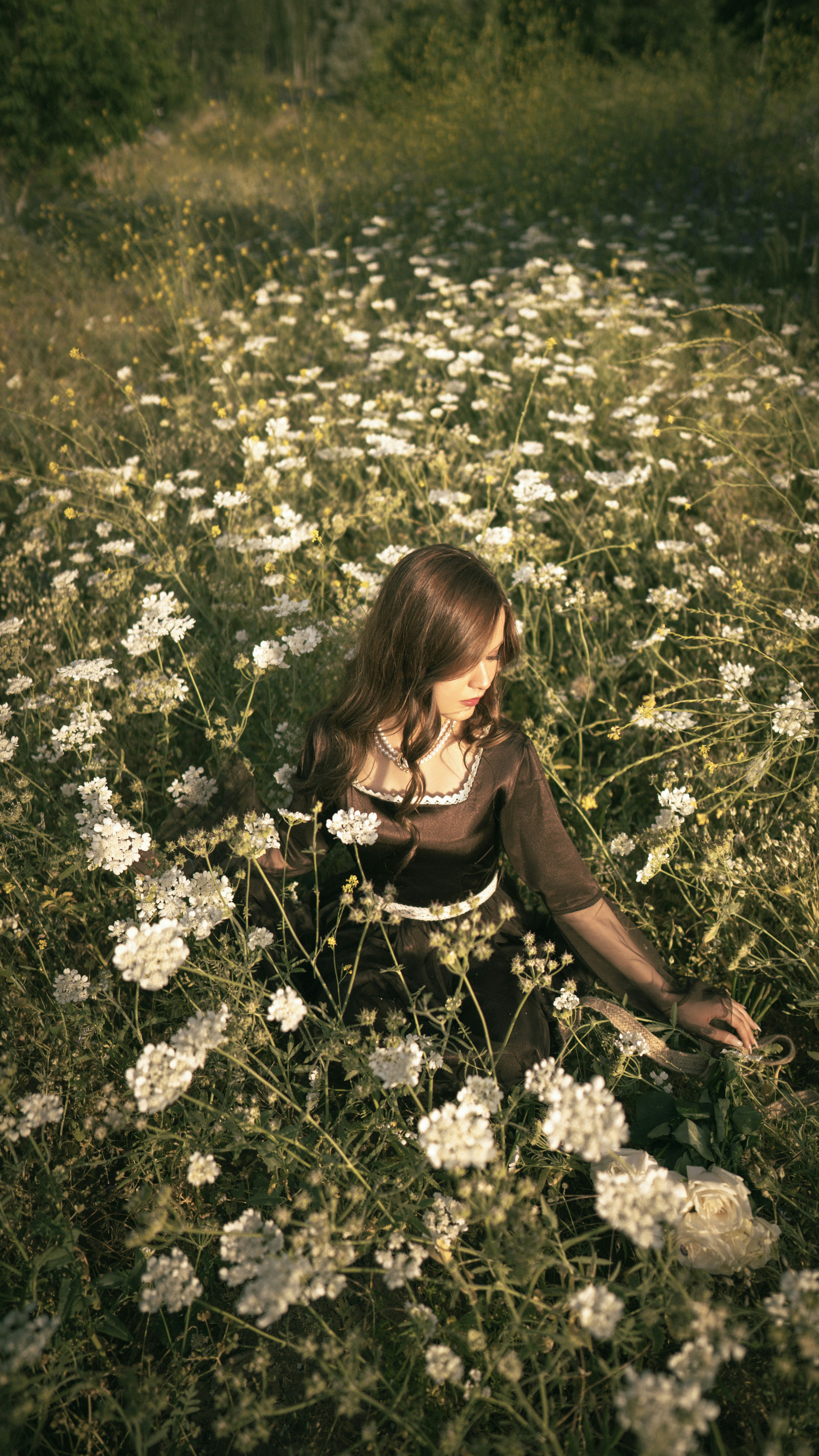 Field of Quiet Grace: A Young Woman among White Blooms
