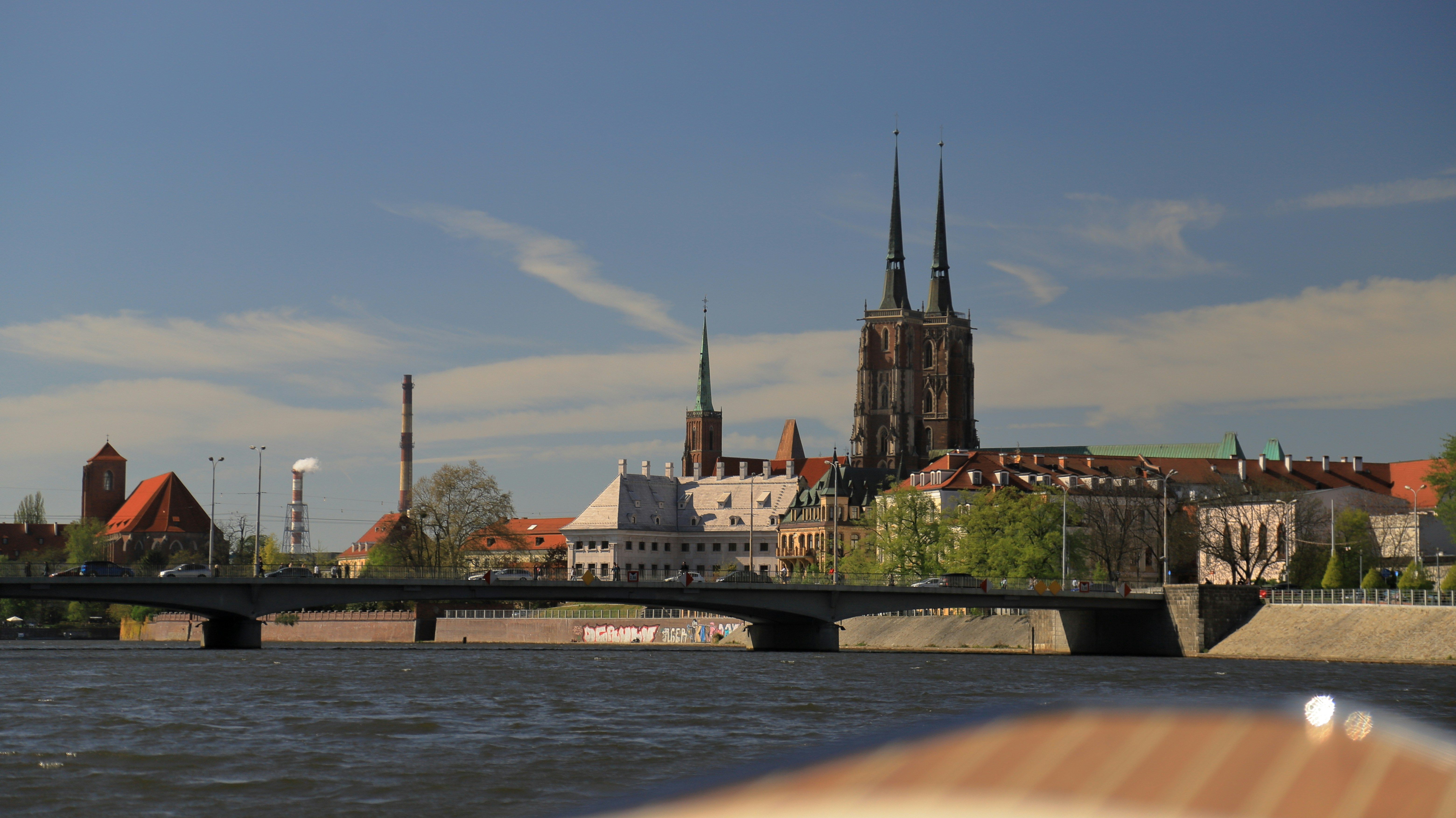 River City Silhouette: Gothic Cathedral Rising Over the Bridge