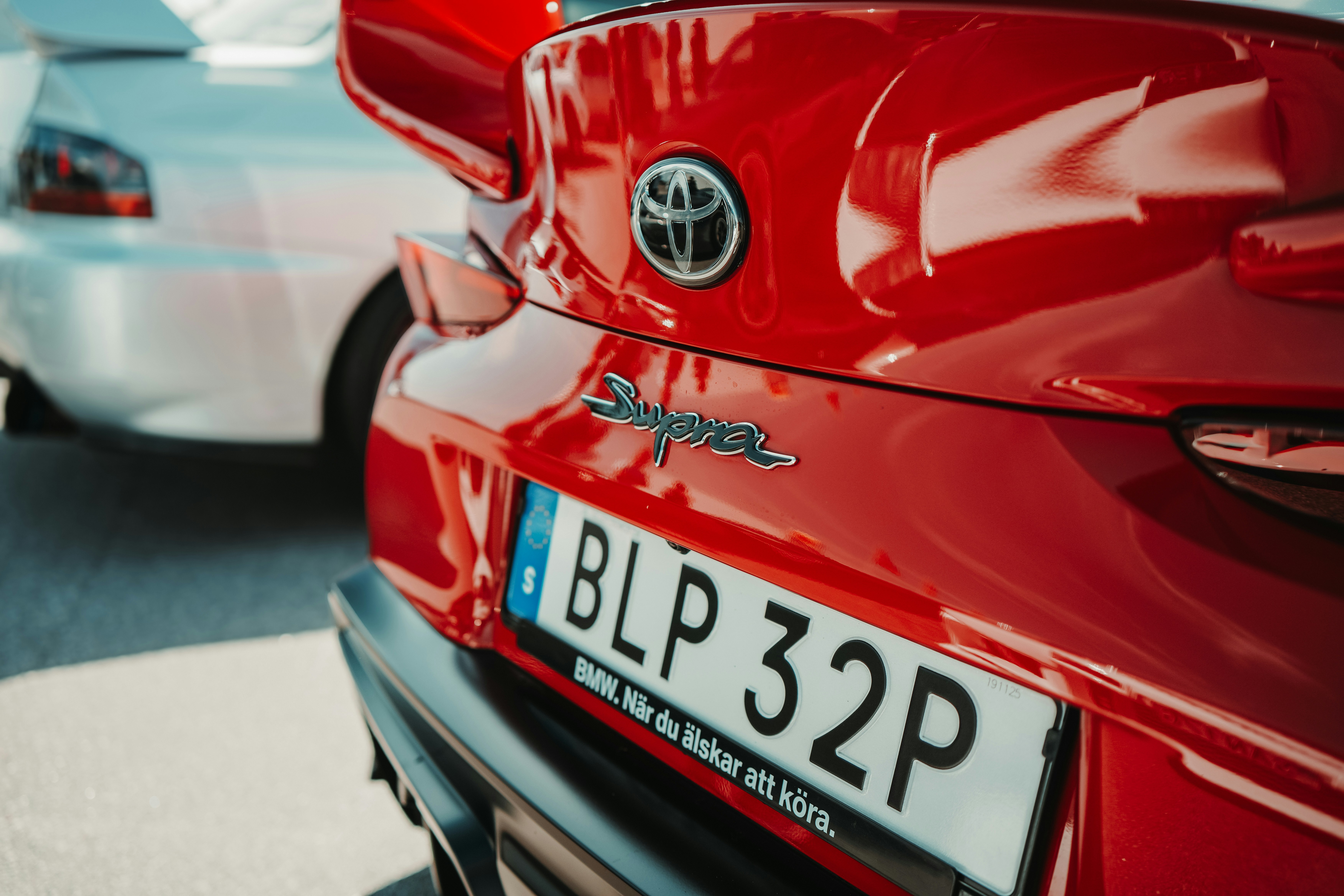 Scarlet Stallion: The Toyota Supra’s Rear Emblem in Focus