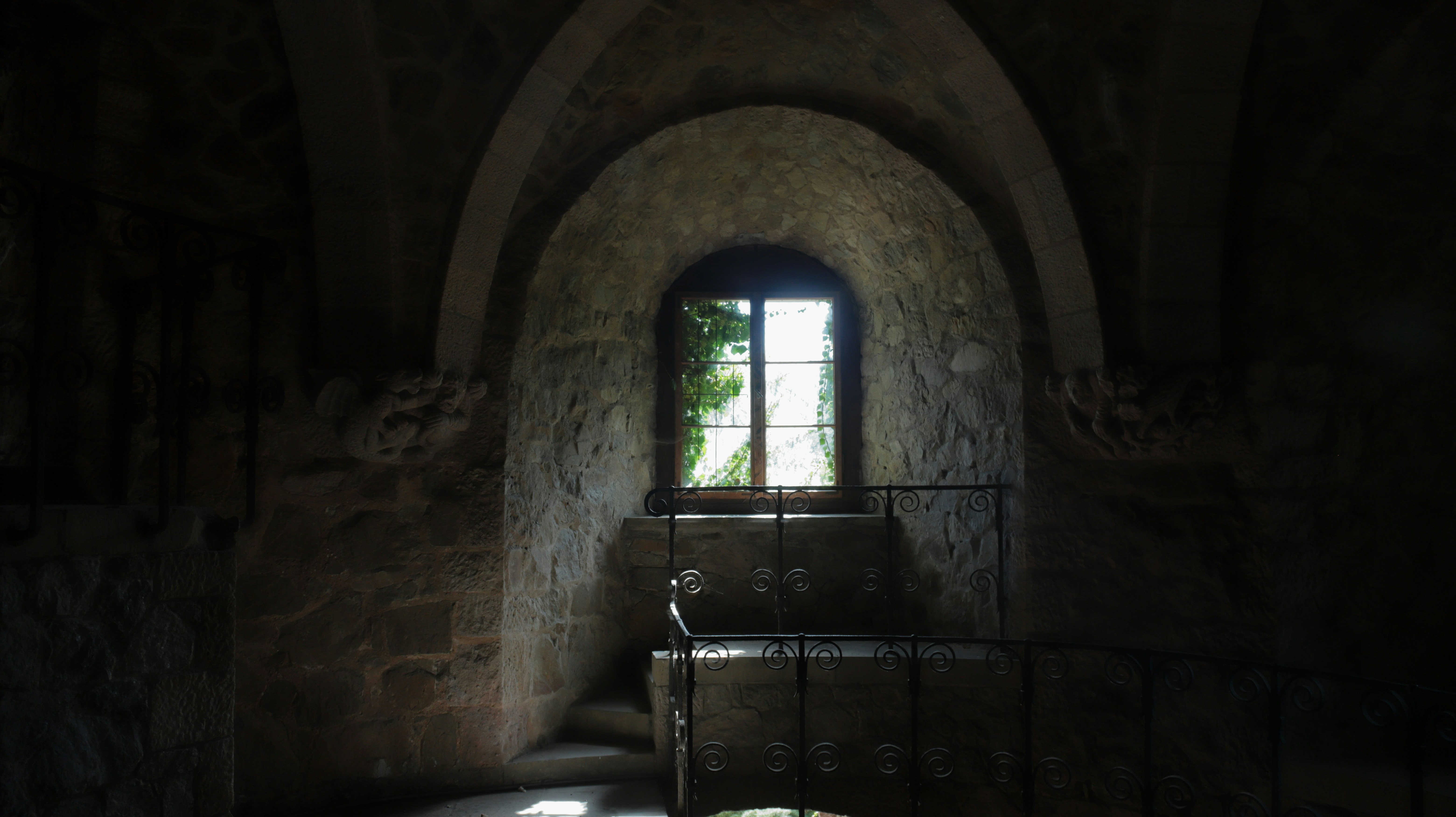 Through the Stone Arch to Light: A Quiet Window
