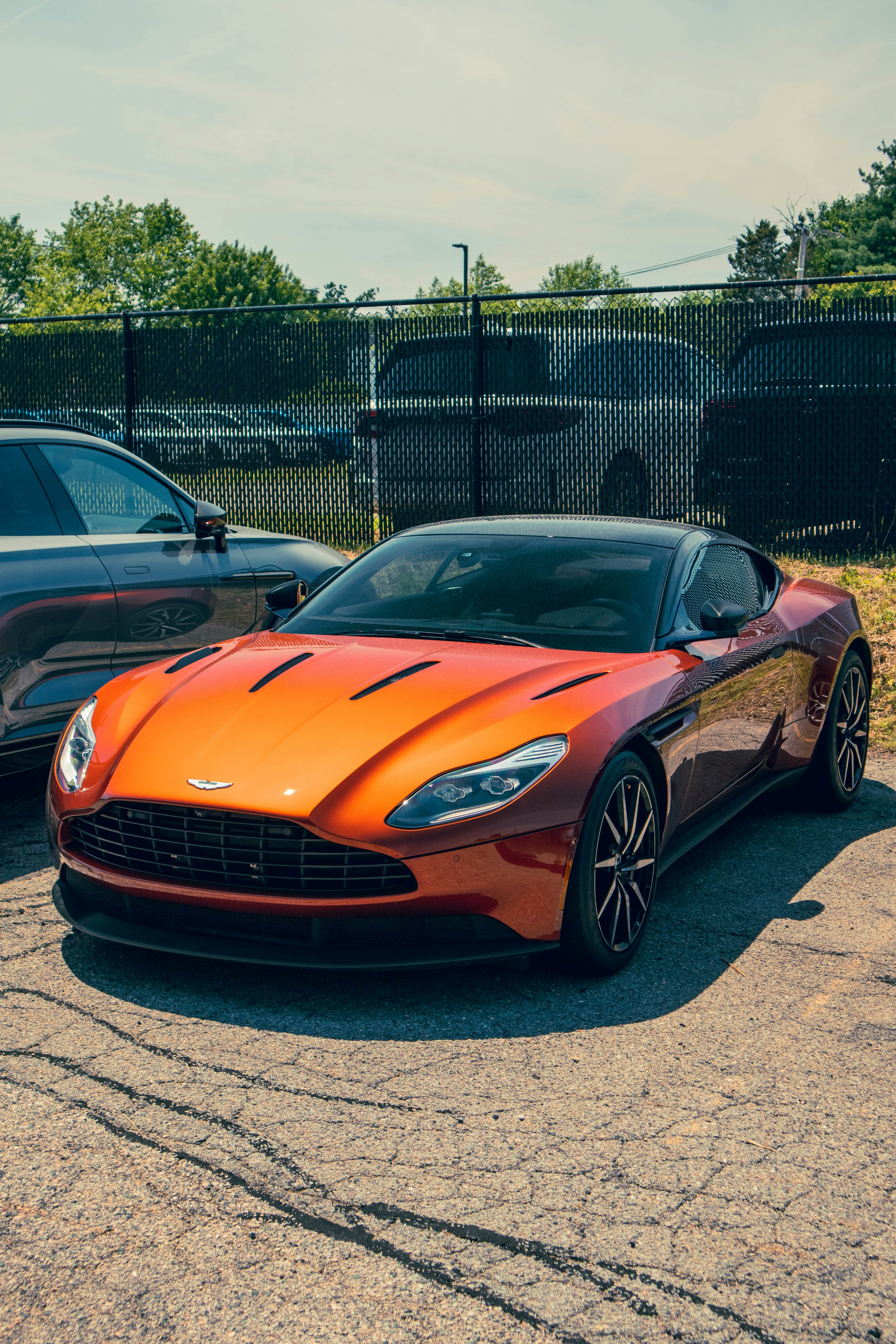 Orange Dream on the Lot: Aston Martin Power Meets Asphalt