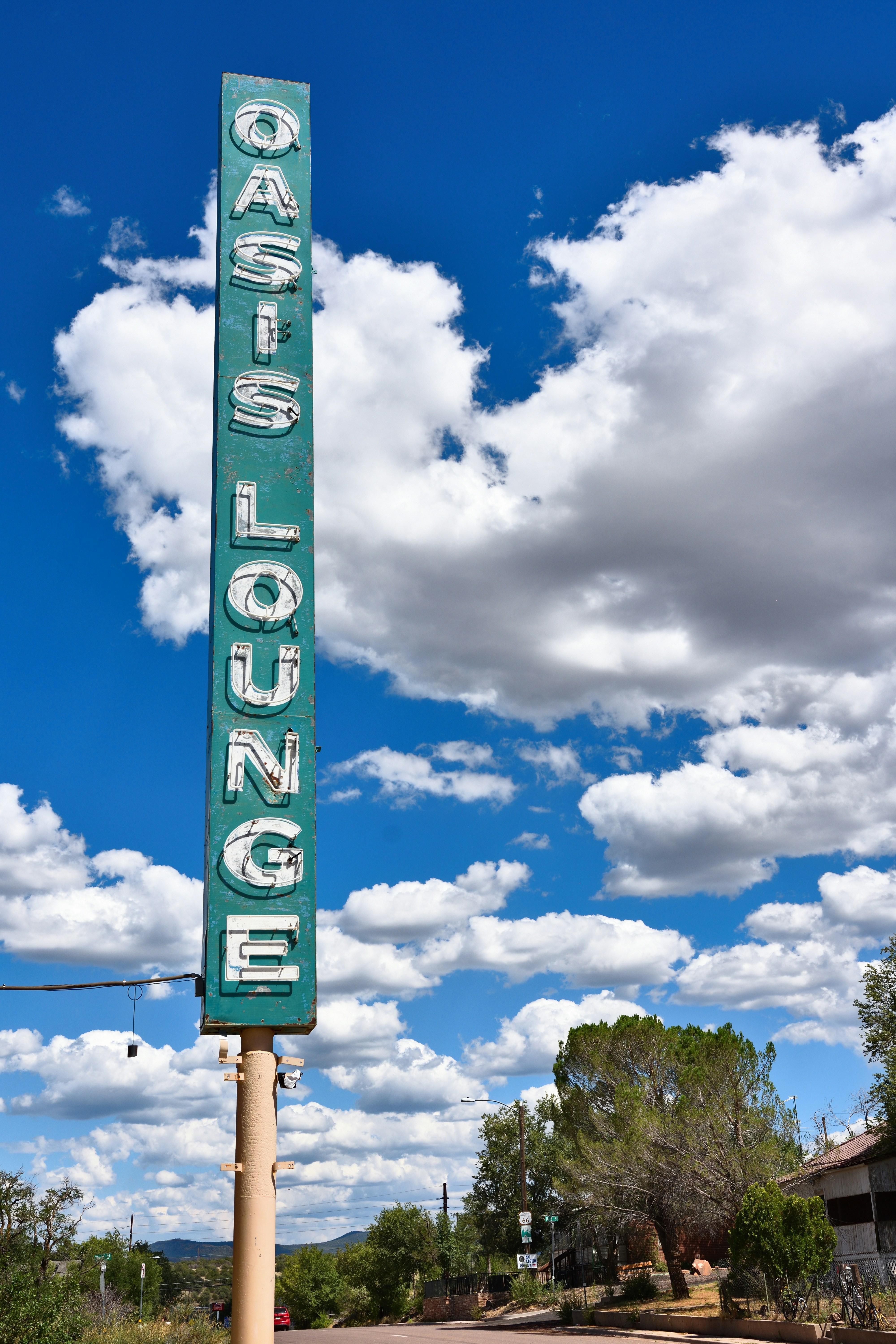 Neon Sign Tower in Bright Arizona Sky