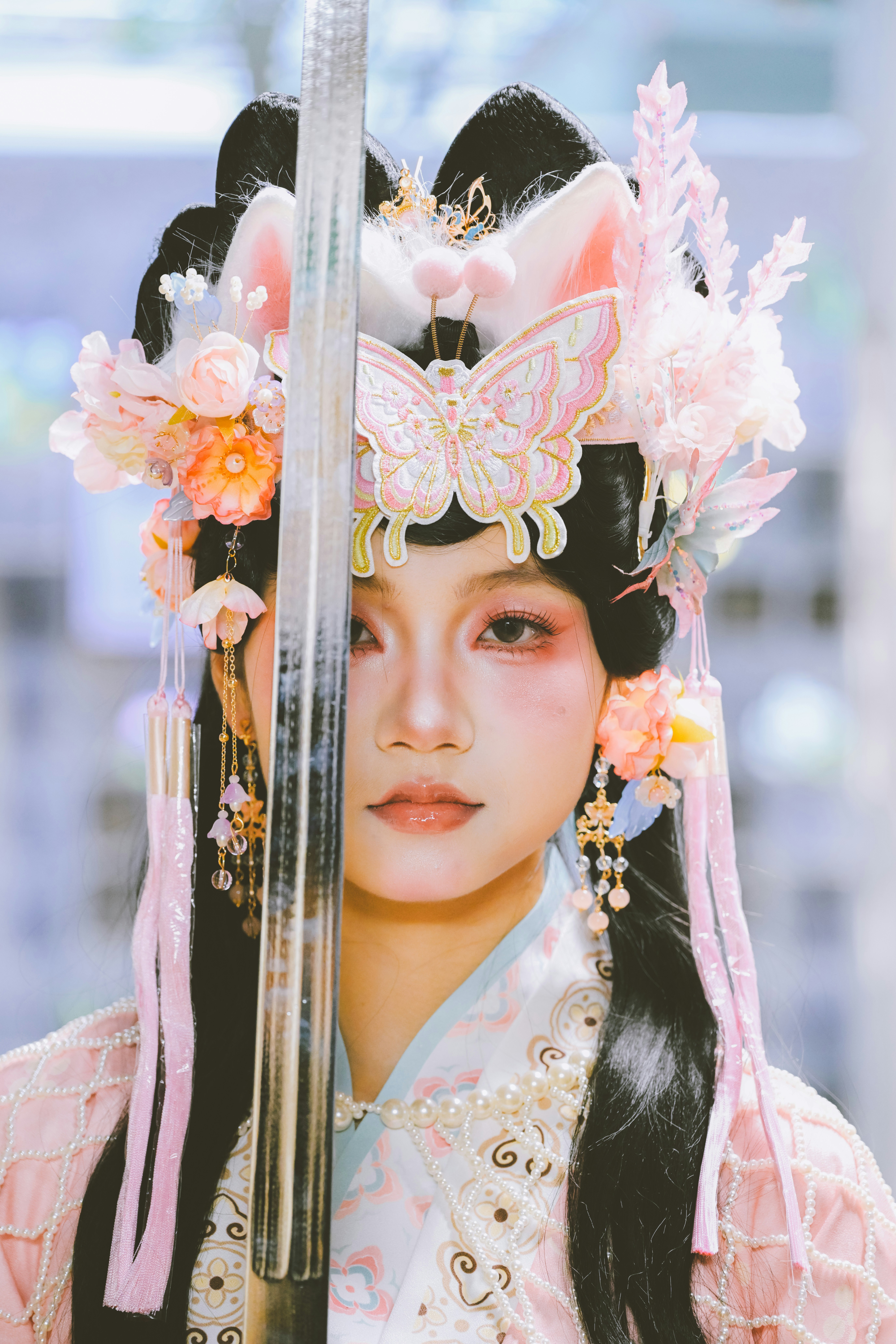 Empress in Bloom: A Portrait Beneath a Butterfly Headdress