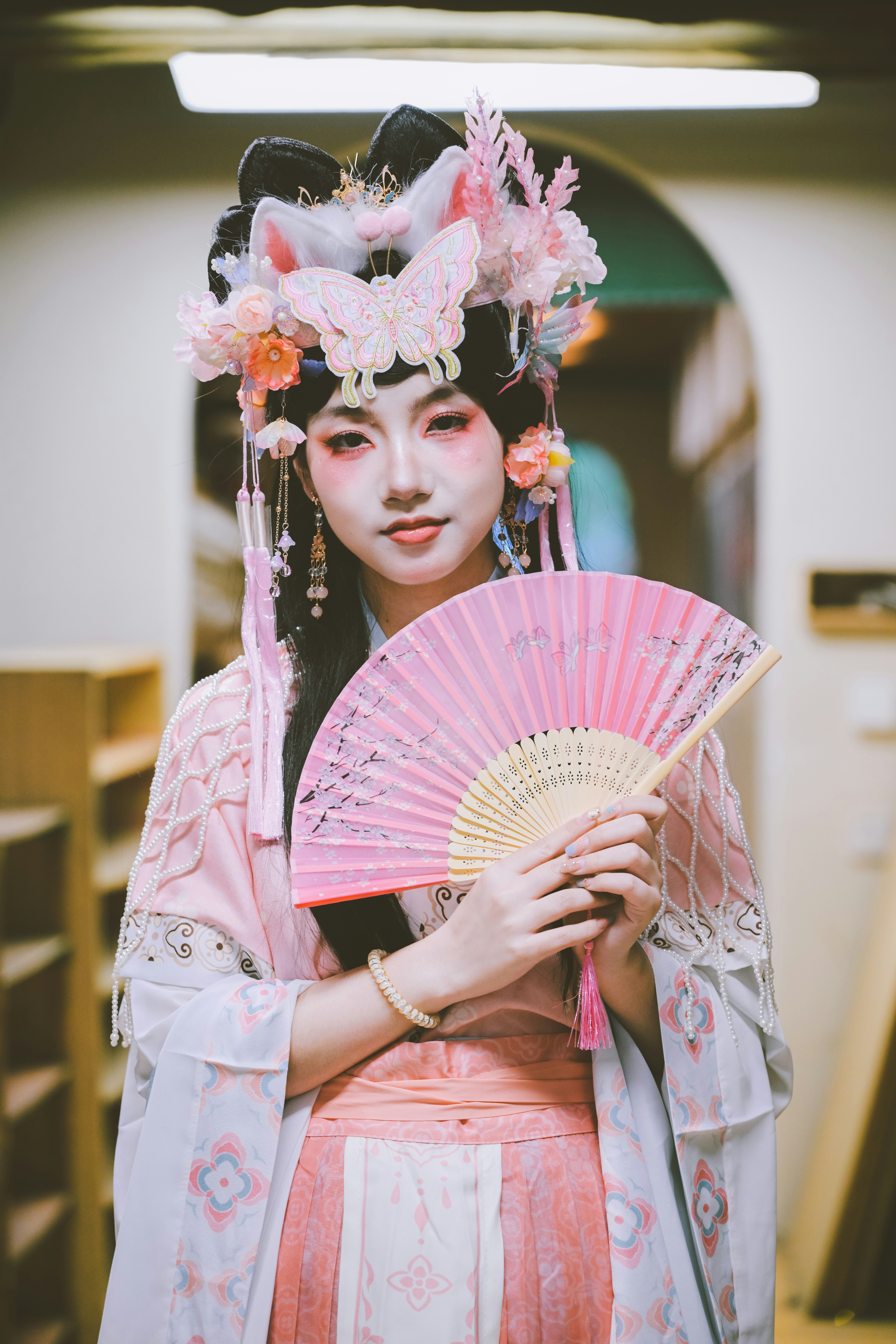 Blush in Silk: A Geisha-inspired Portrait with a Pink Fan