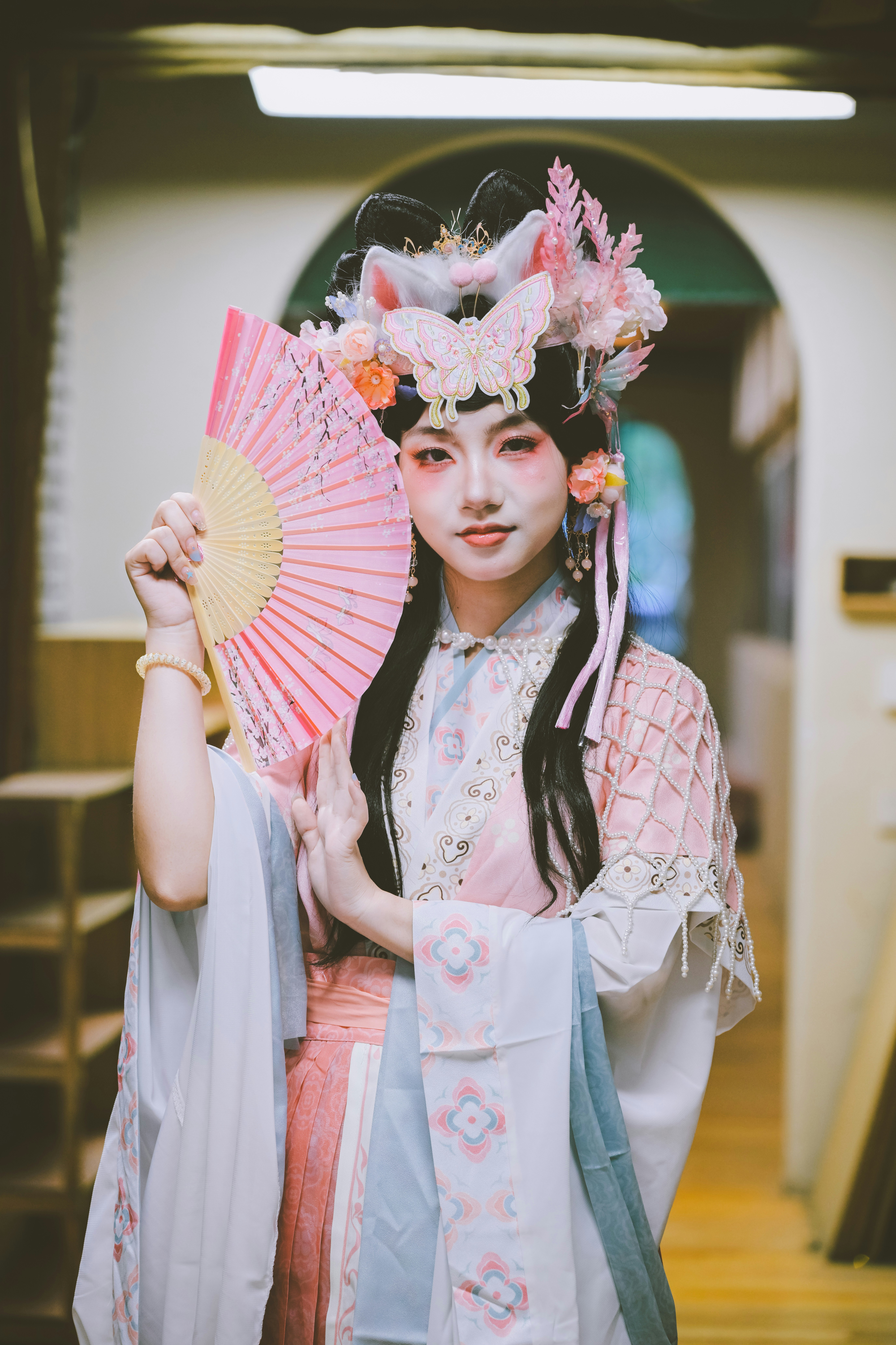 Gentle Pose in Pastel Kimono with Pink Fan