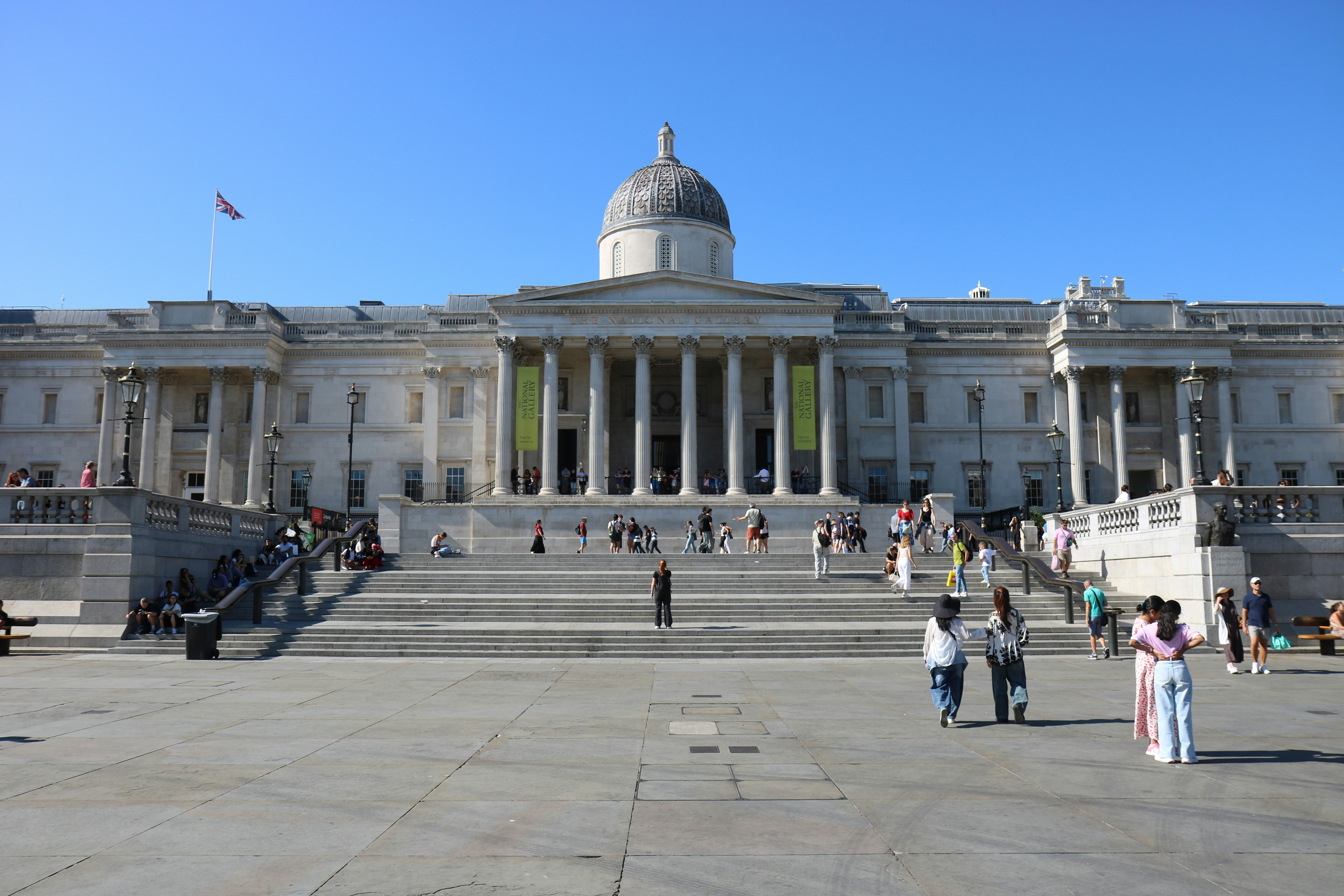 Staircase to the Dome: A Neoclassical Facade Bordered by Columns