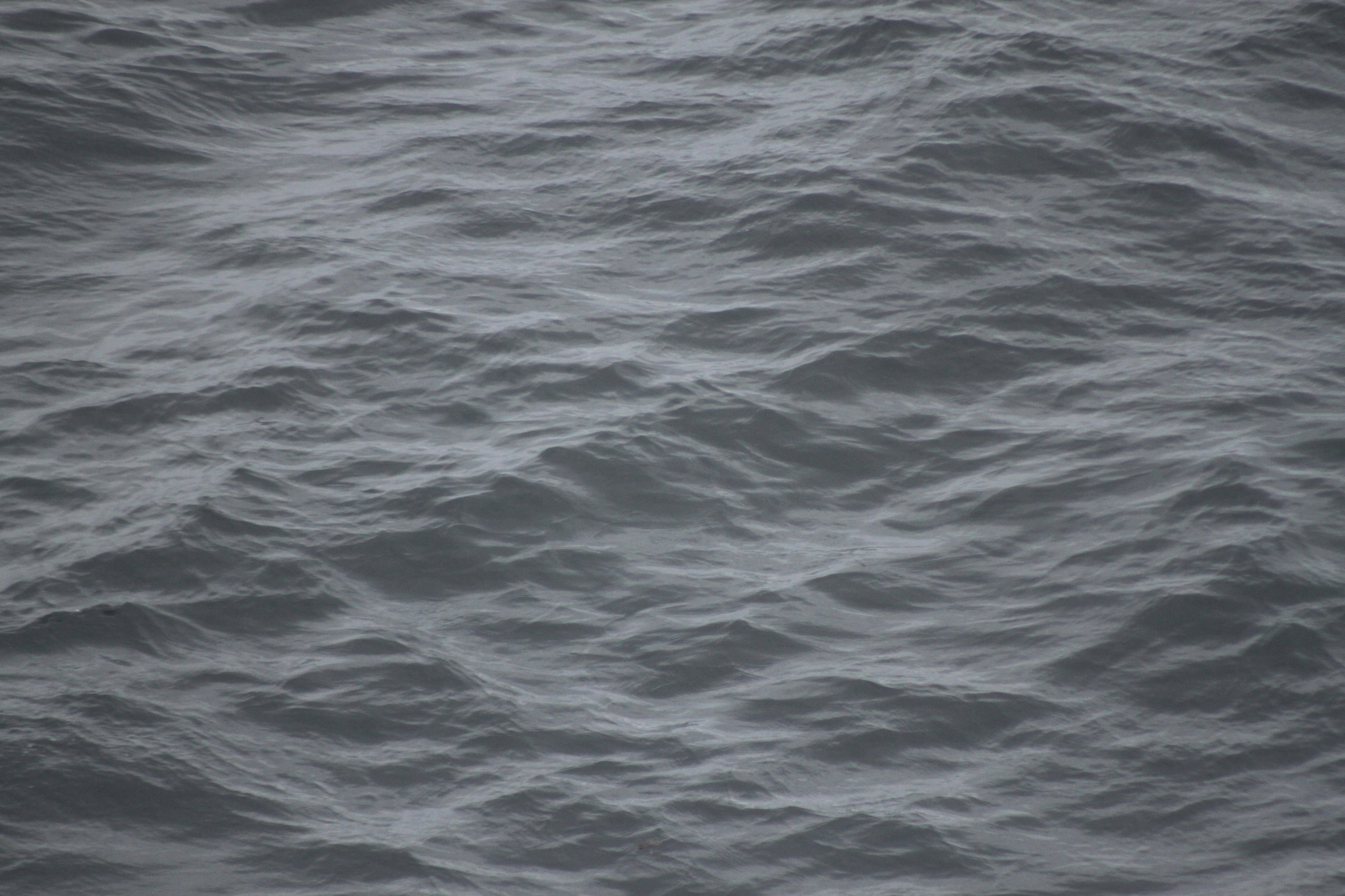 Midday Sea Texture: Glassy Ripples Across Quiet Waters
