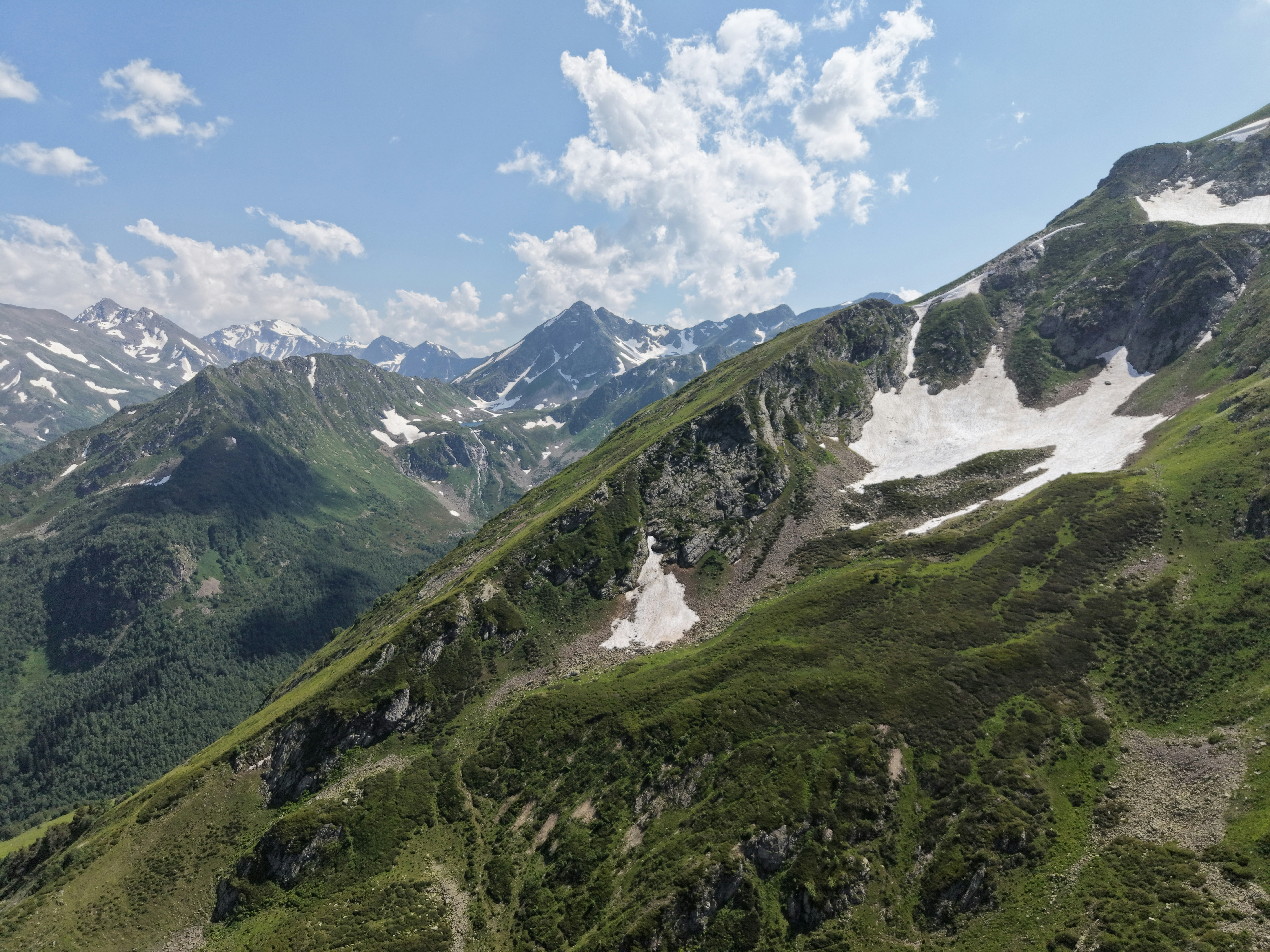 Rugged Alpine Ridge Under a Reach of Blue Sky
