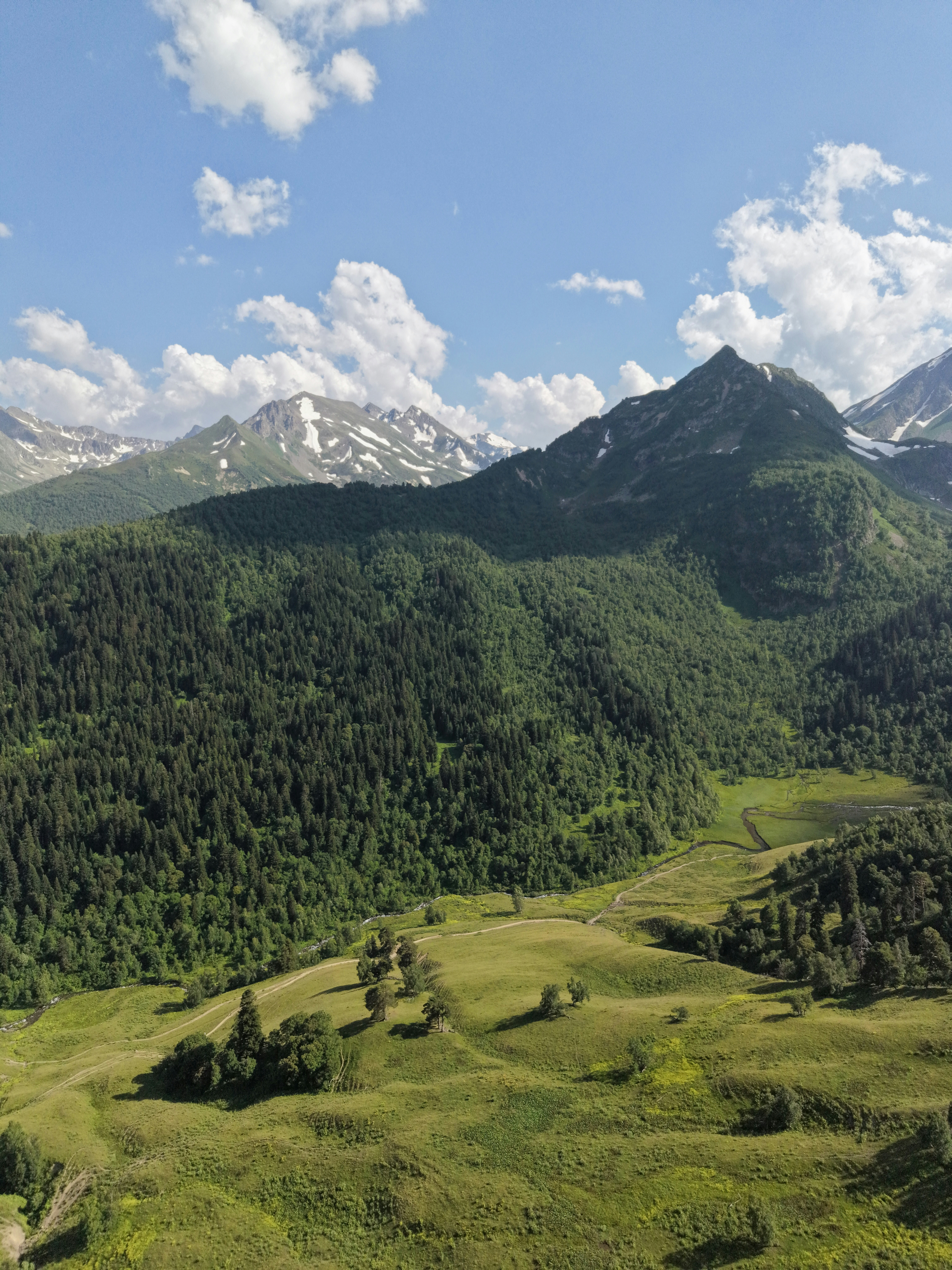 Azure Peaks Over Verdant Valleys