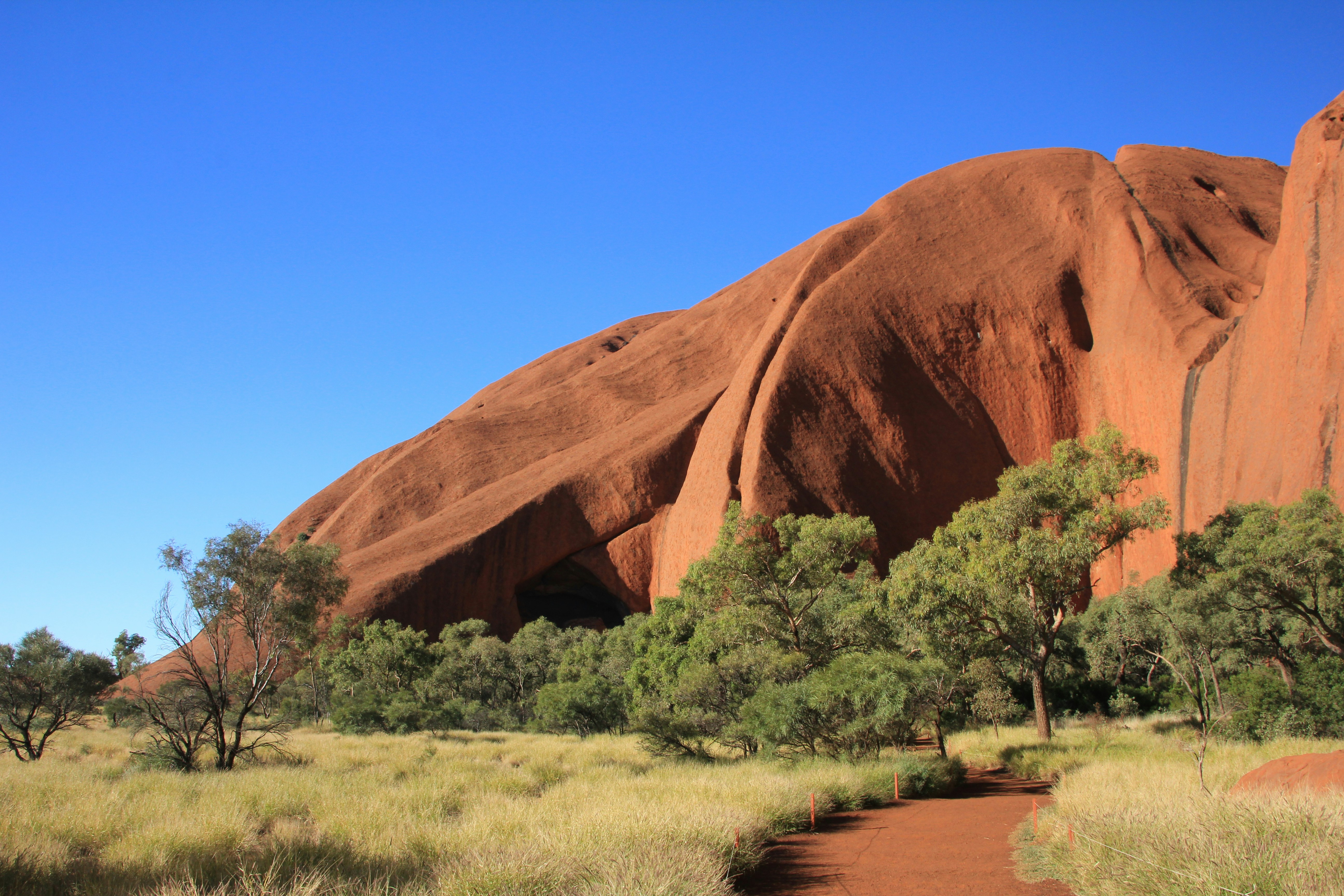 Red Granite Monoliths Rise Over a Desert Path