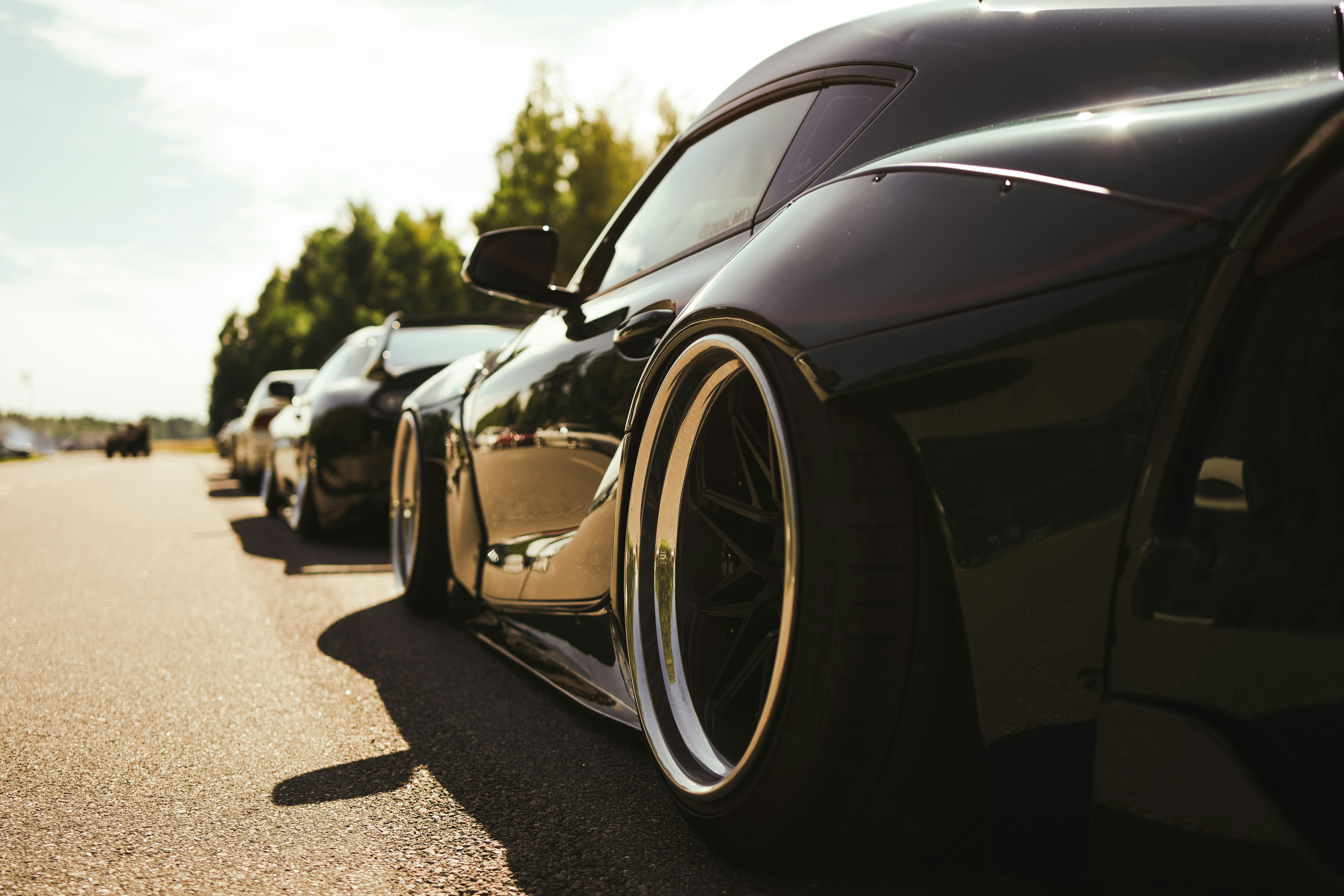 Low-Slung Lineup: A Side-View of Stacked Sports Cars