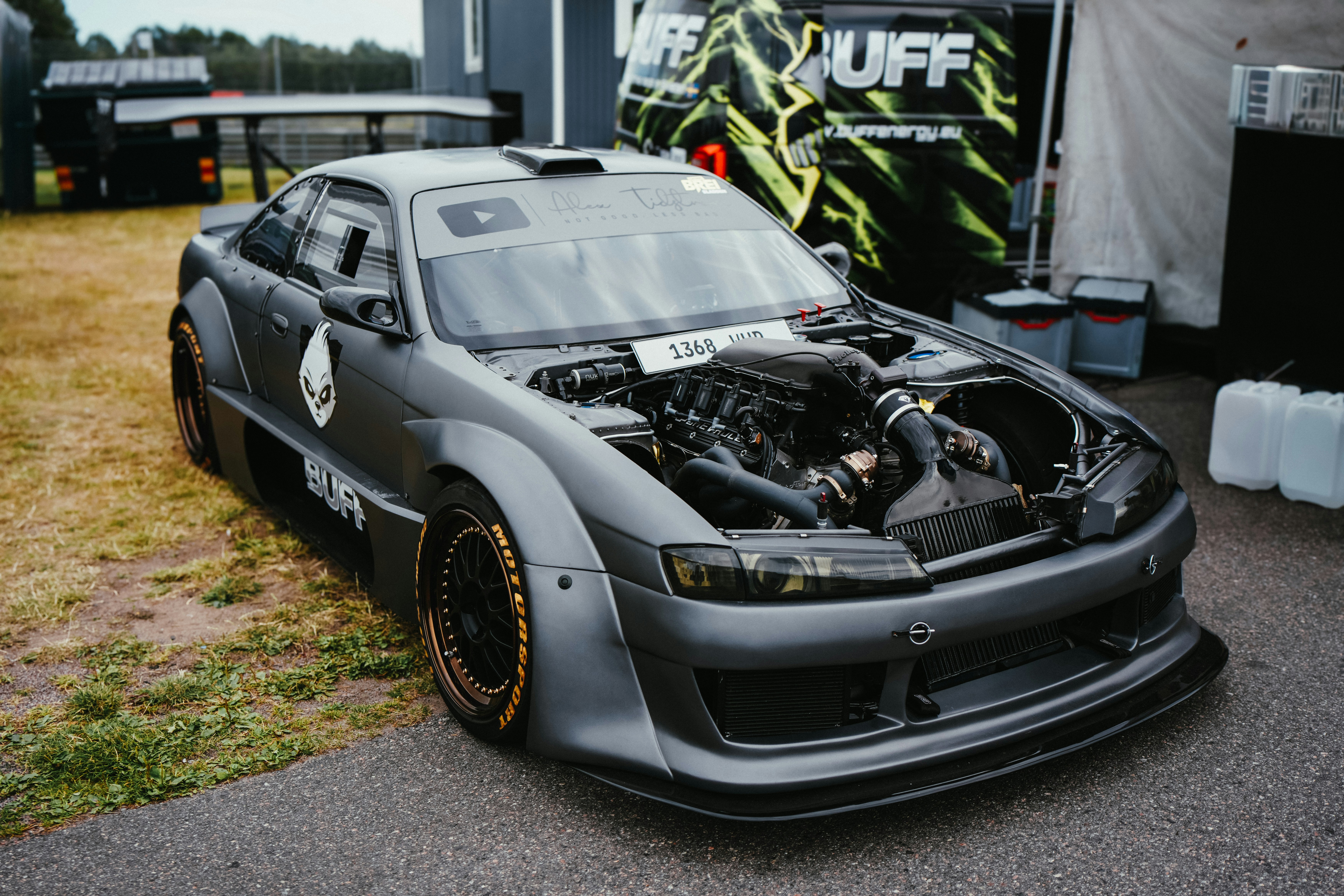 Matte-bronze Drift Predator: A Front-Engine Monster Tuned for the Track