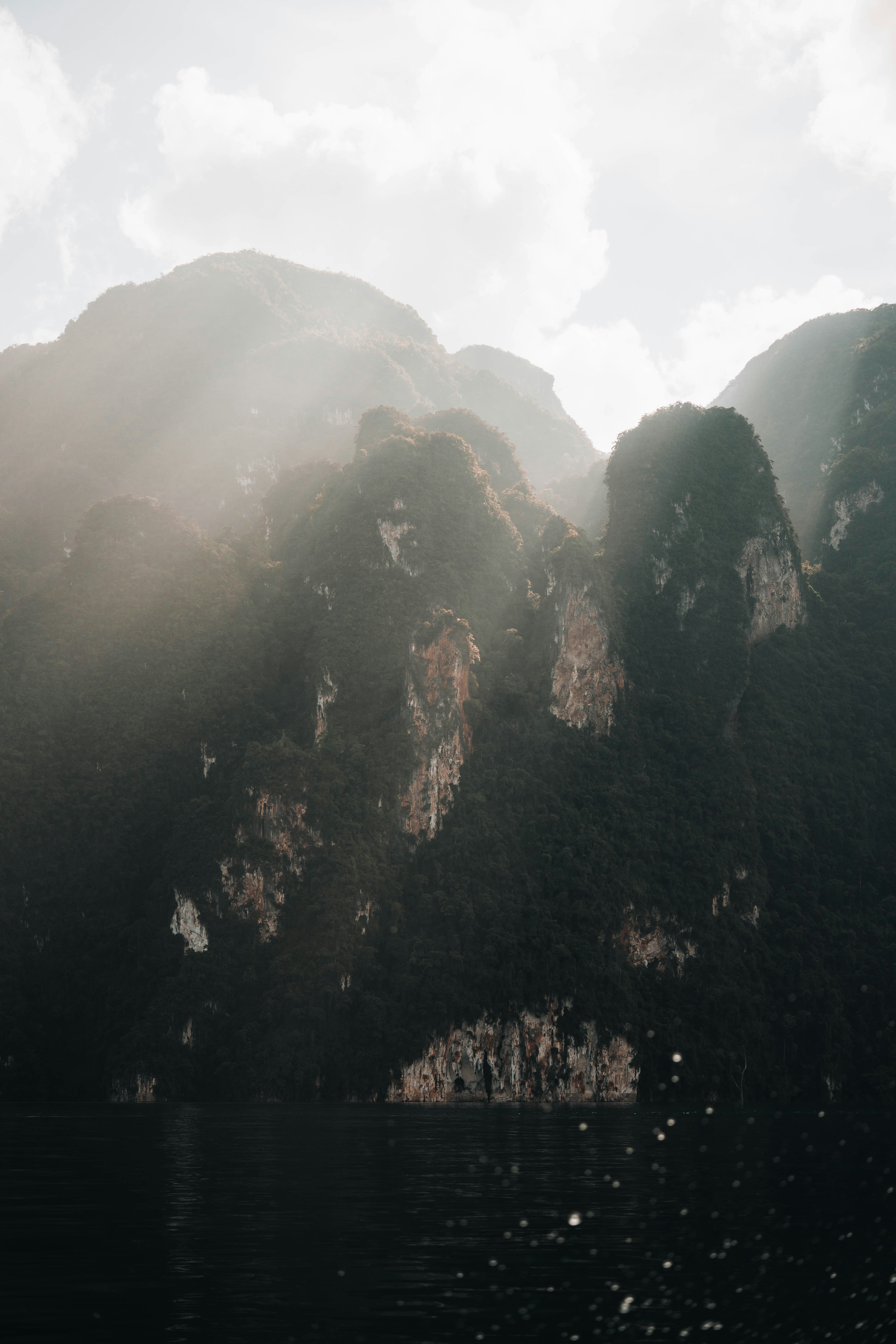 Mist over Limestone Giants by the Quiet Lake