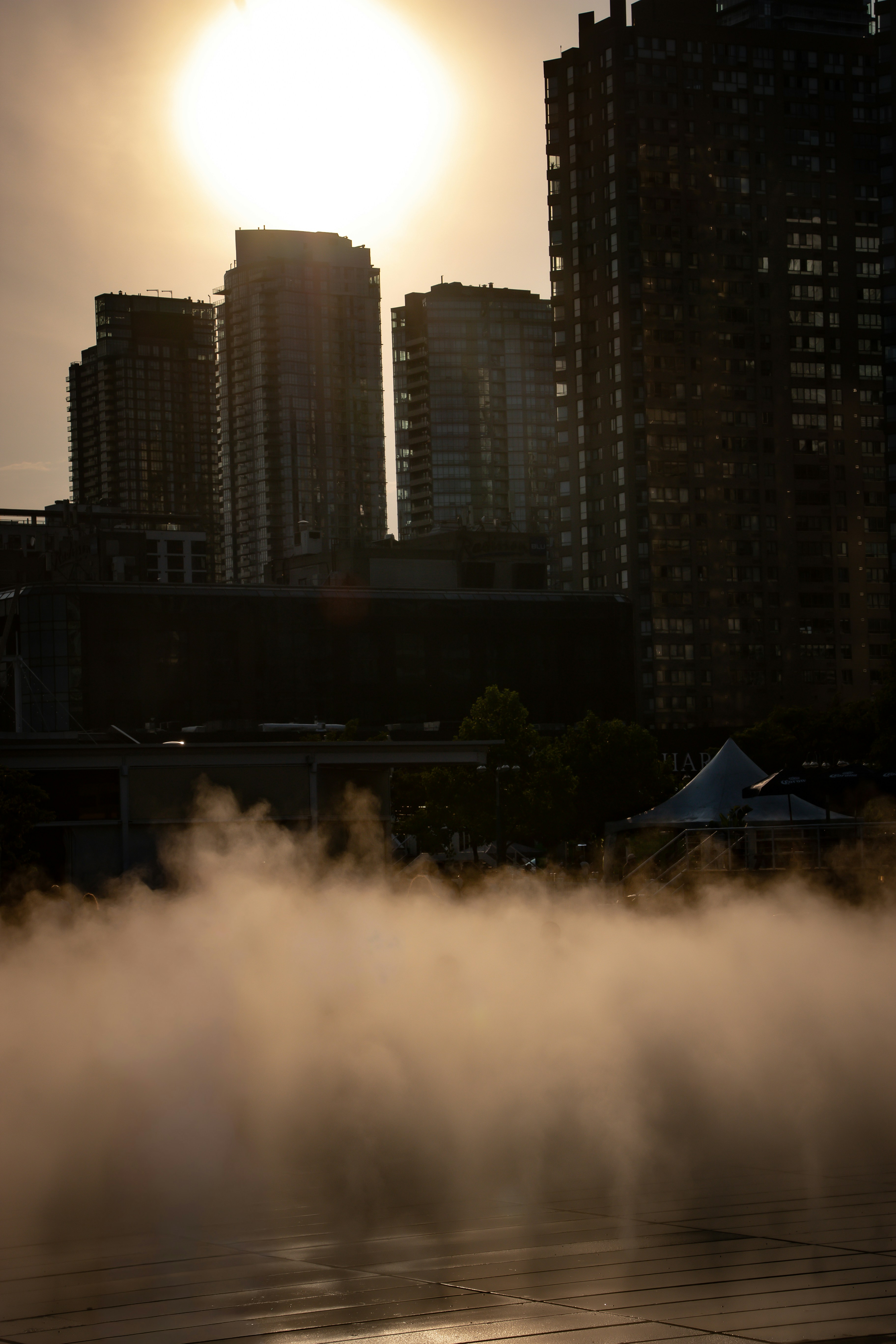 Sunrise Over Steam and Skyscrapers