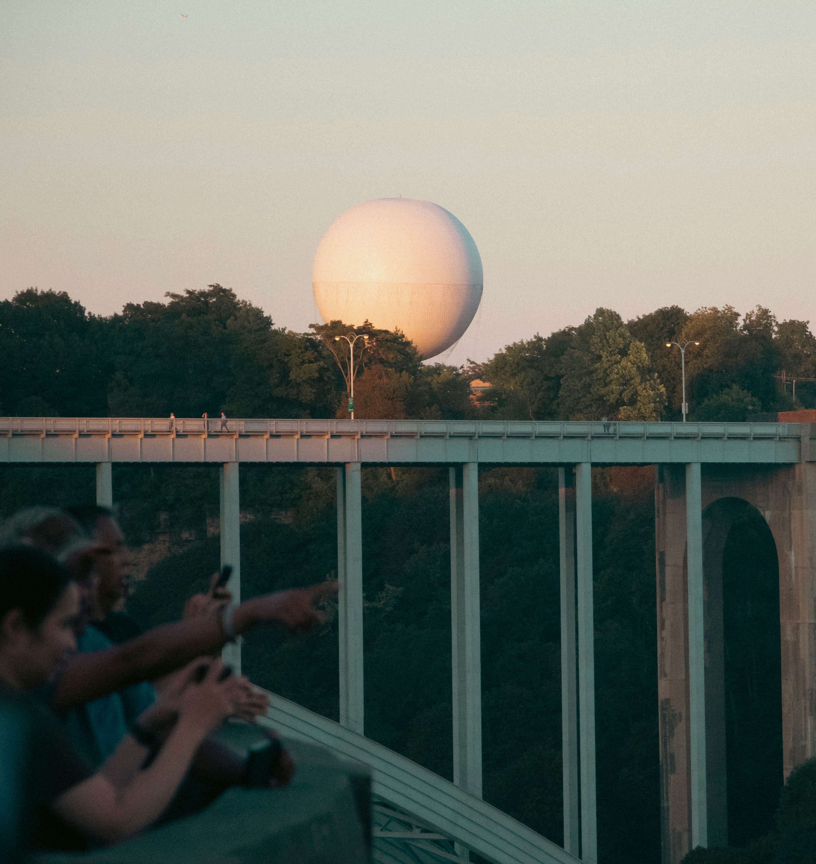 Balloon-like Sphere Over the River Valley