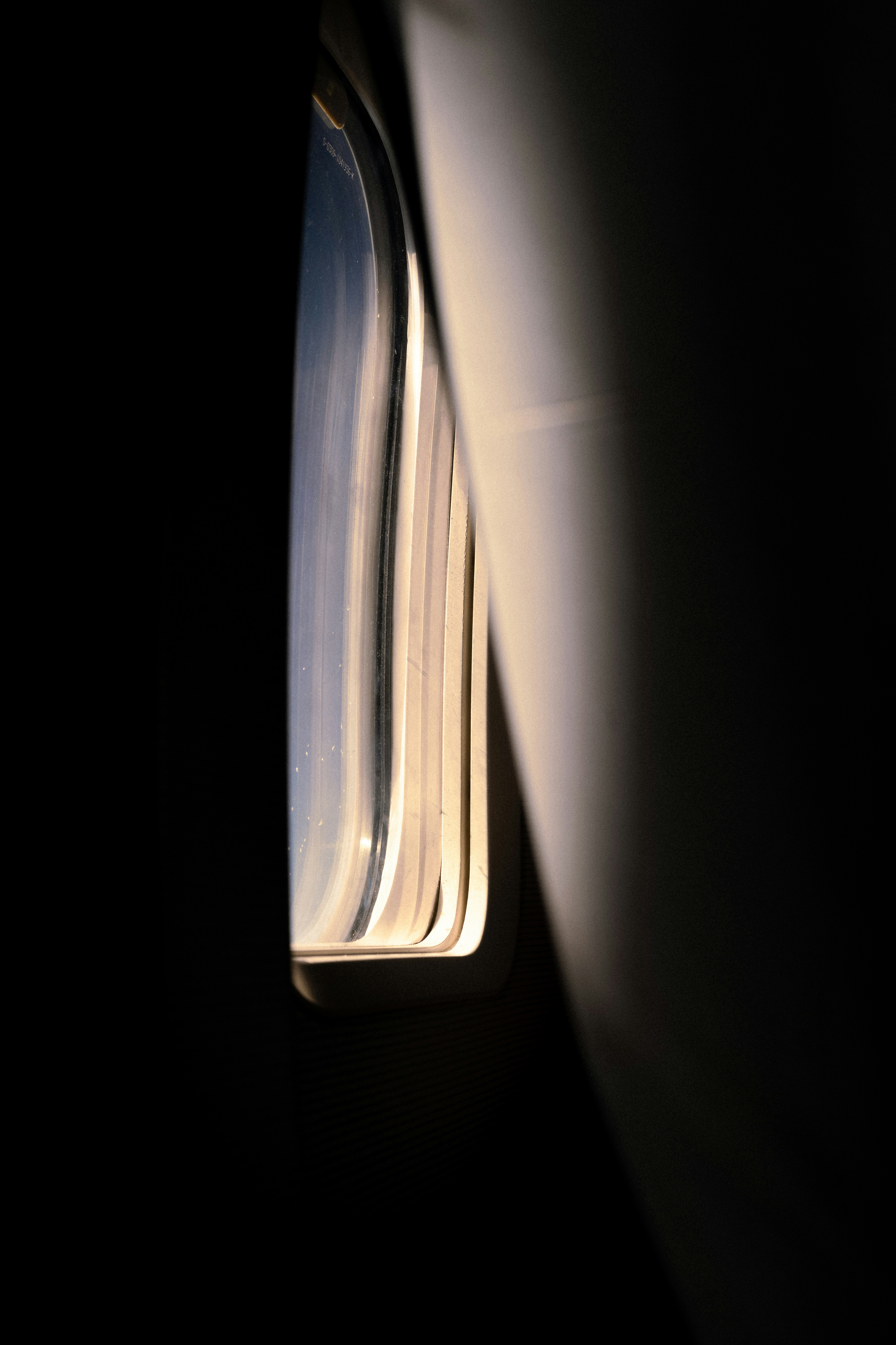 Window Light: A Narrow View of a Flight Outside