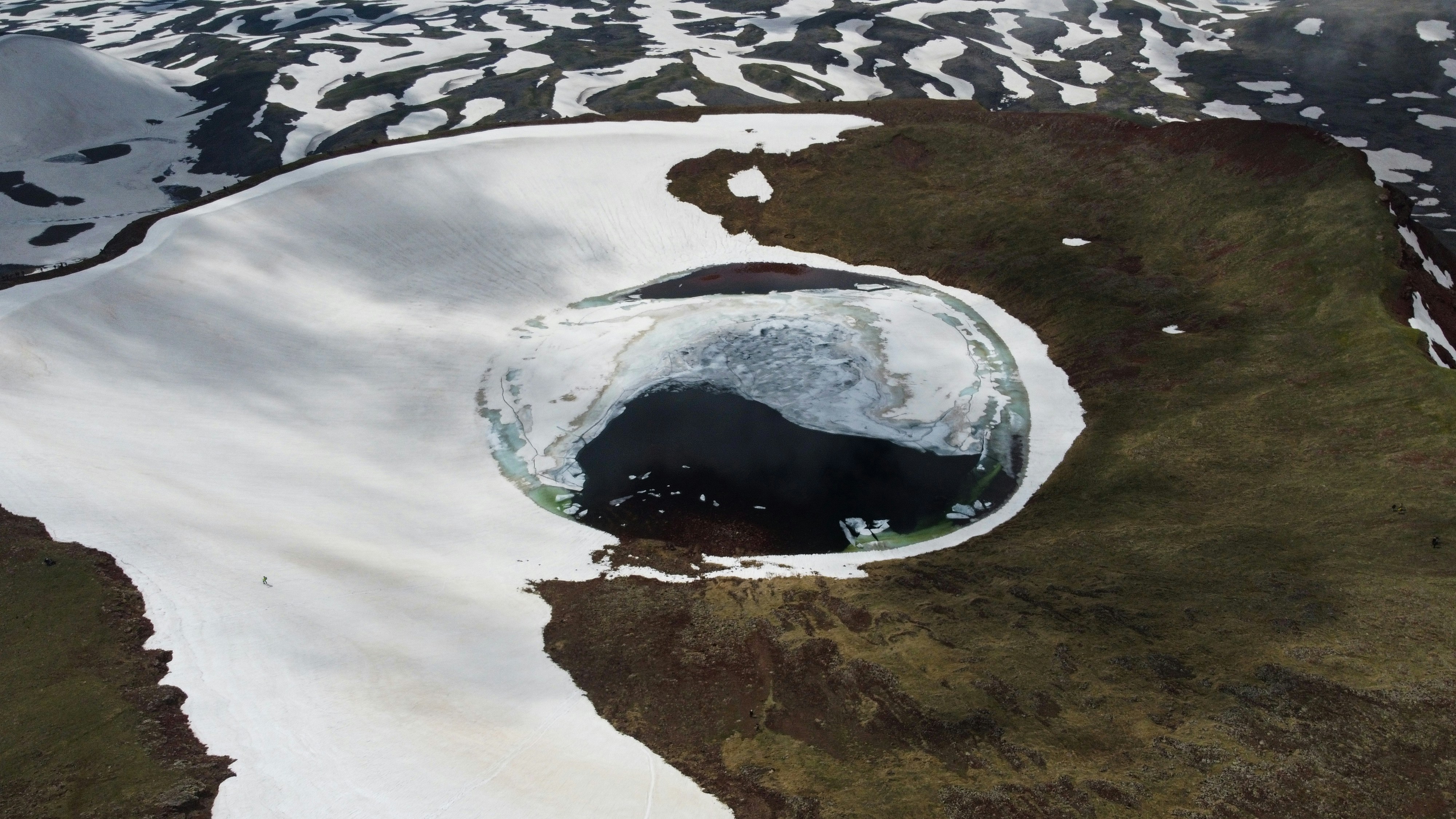 Ice Bowl in a Snow-Torn Landscape