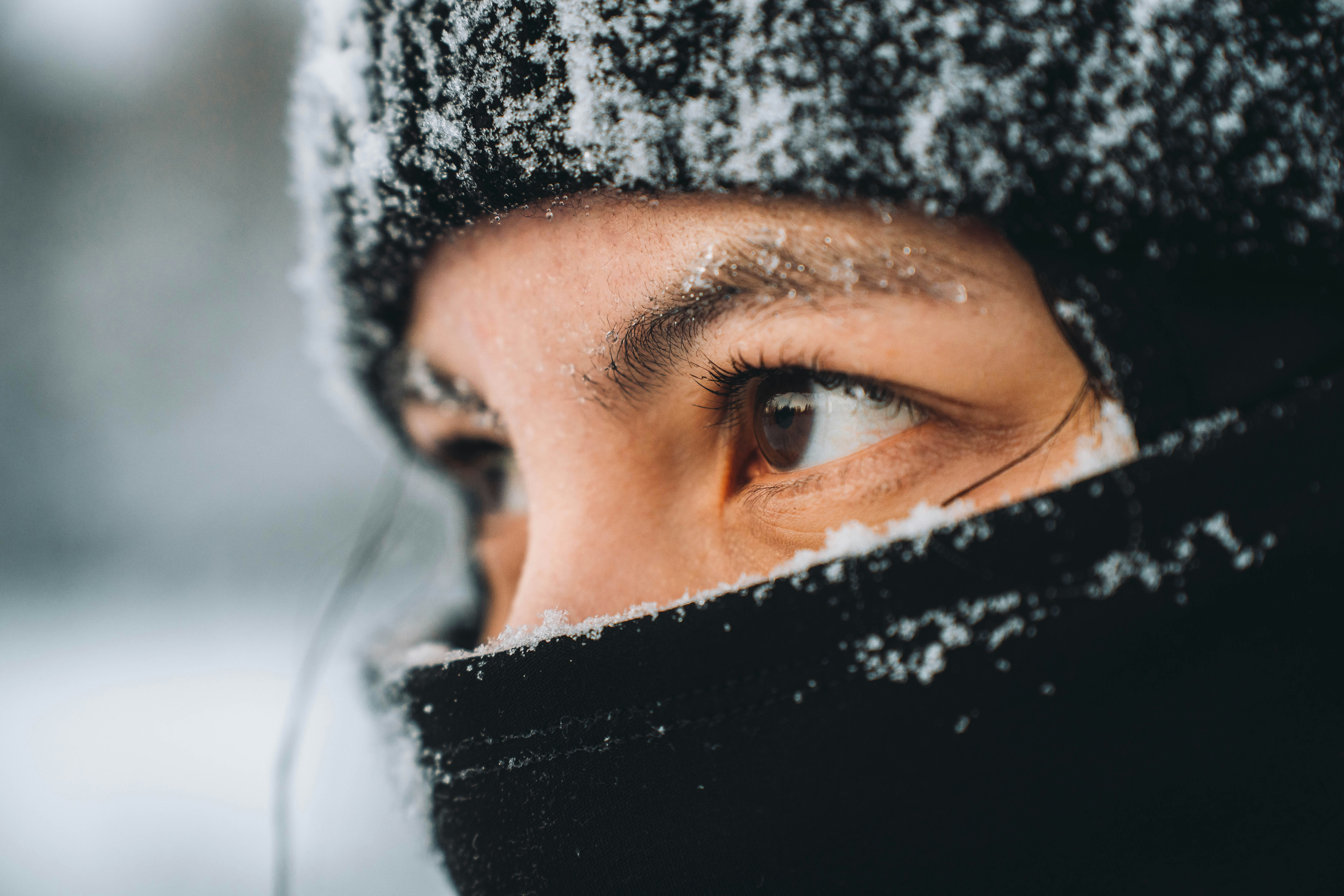 Ice-Exposed Gaze: Frost on a Masked Face