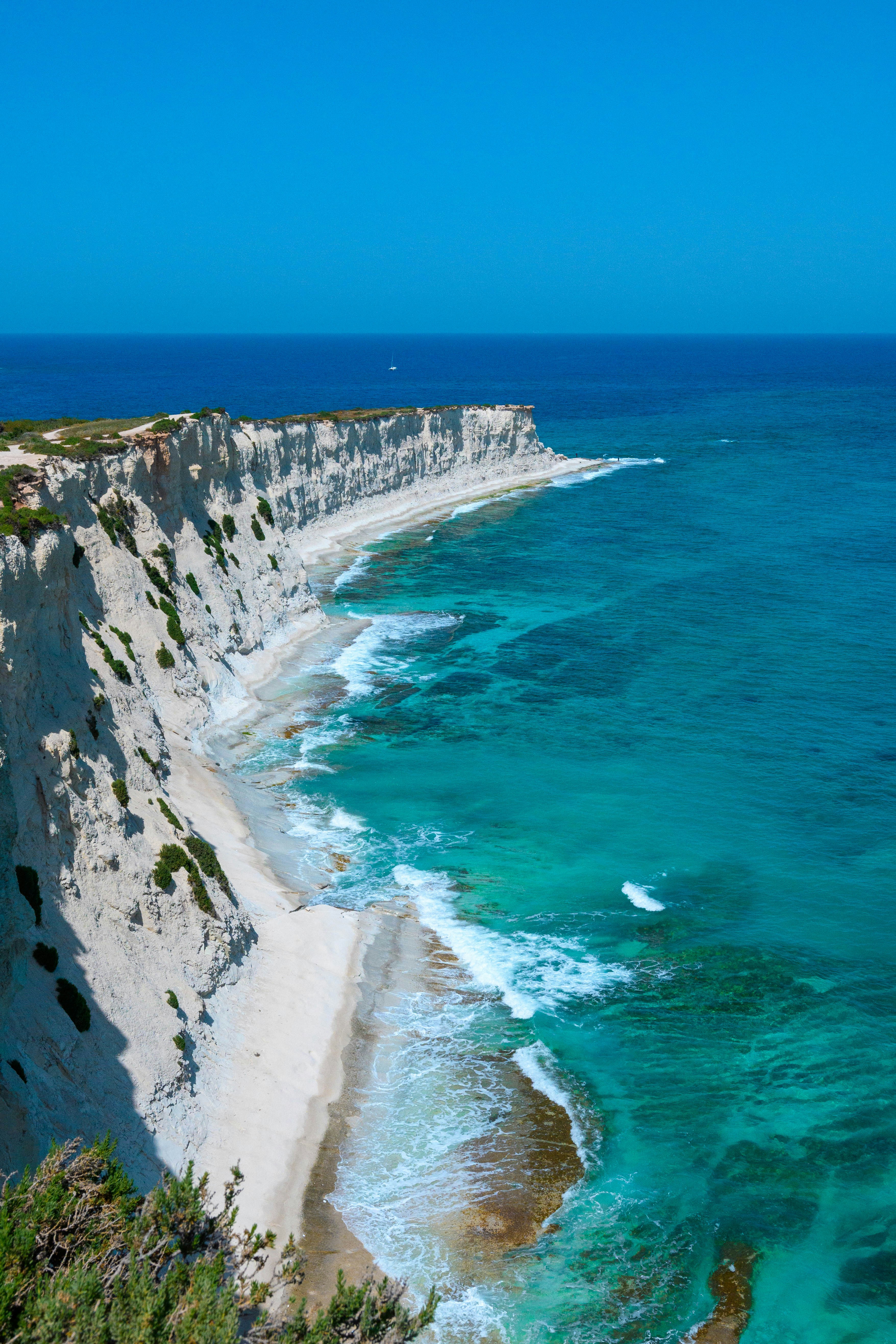 Cliffs and Azure Sea: A Brushed Coastal Horizon